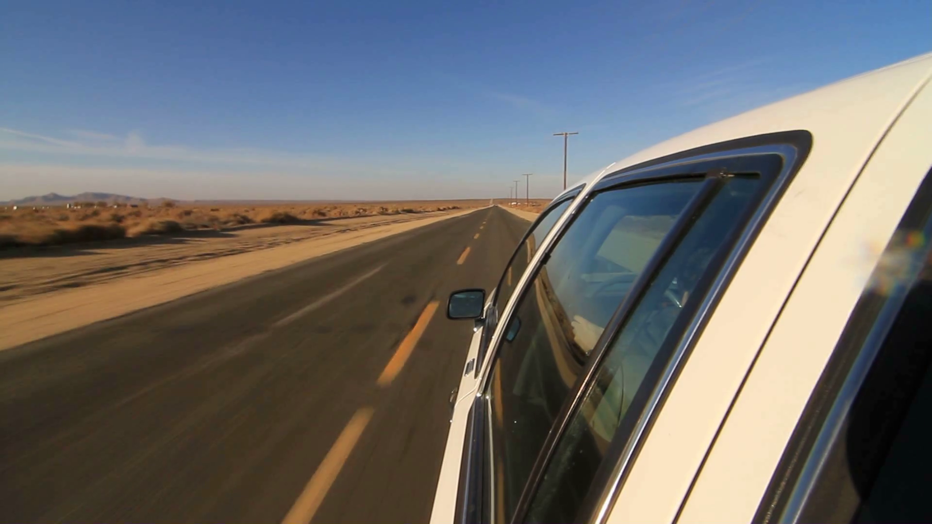 Desert Drive: Car's Side View On Open Stock Footage SBV-348435082 ...