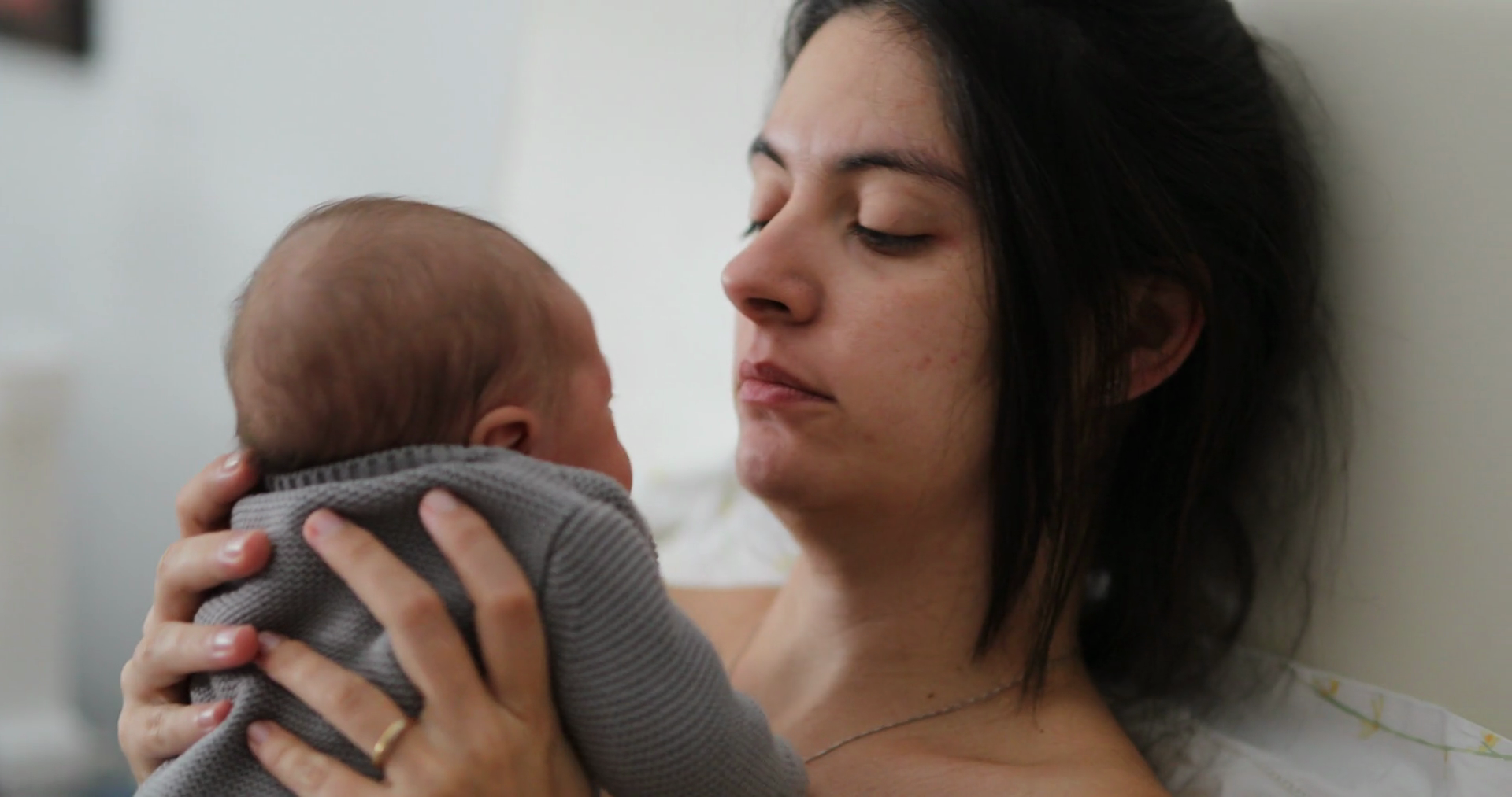 Mother's Loving Embrace: Holding Newborn Stock Footage SBV-348430785 ...