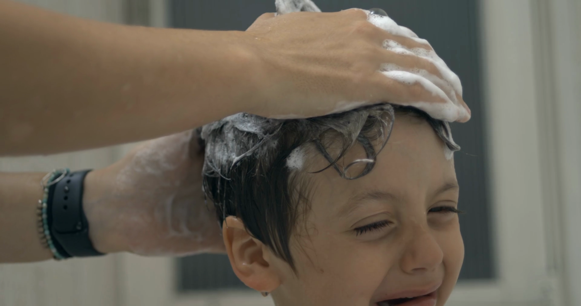 Child Crying Mothers Hand Scrubs Hair With Stock Footage SBV-348482730 ...