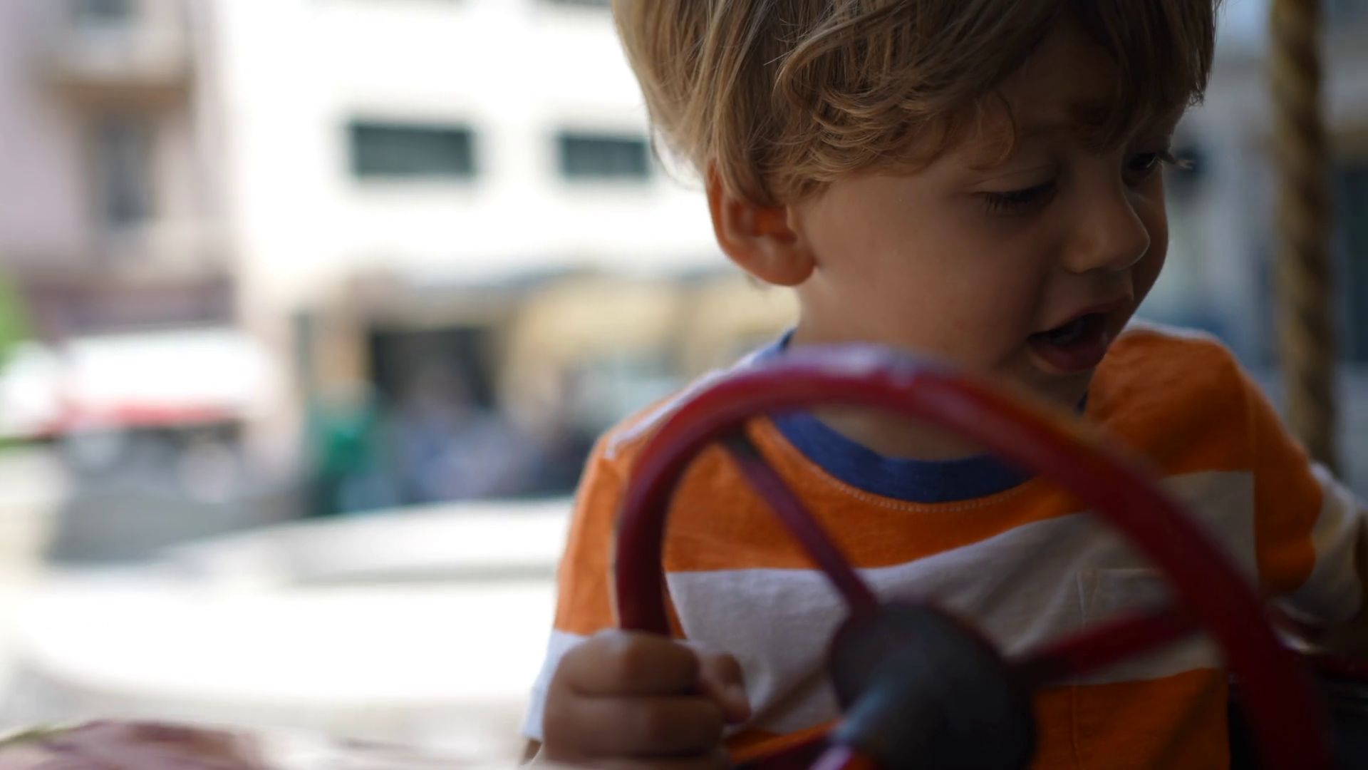 Child Enjoying Ride On Carousel In Summer Stock Footage SBV-348938038 ...