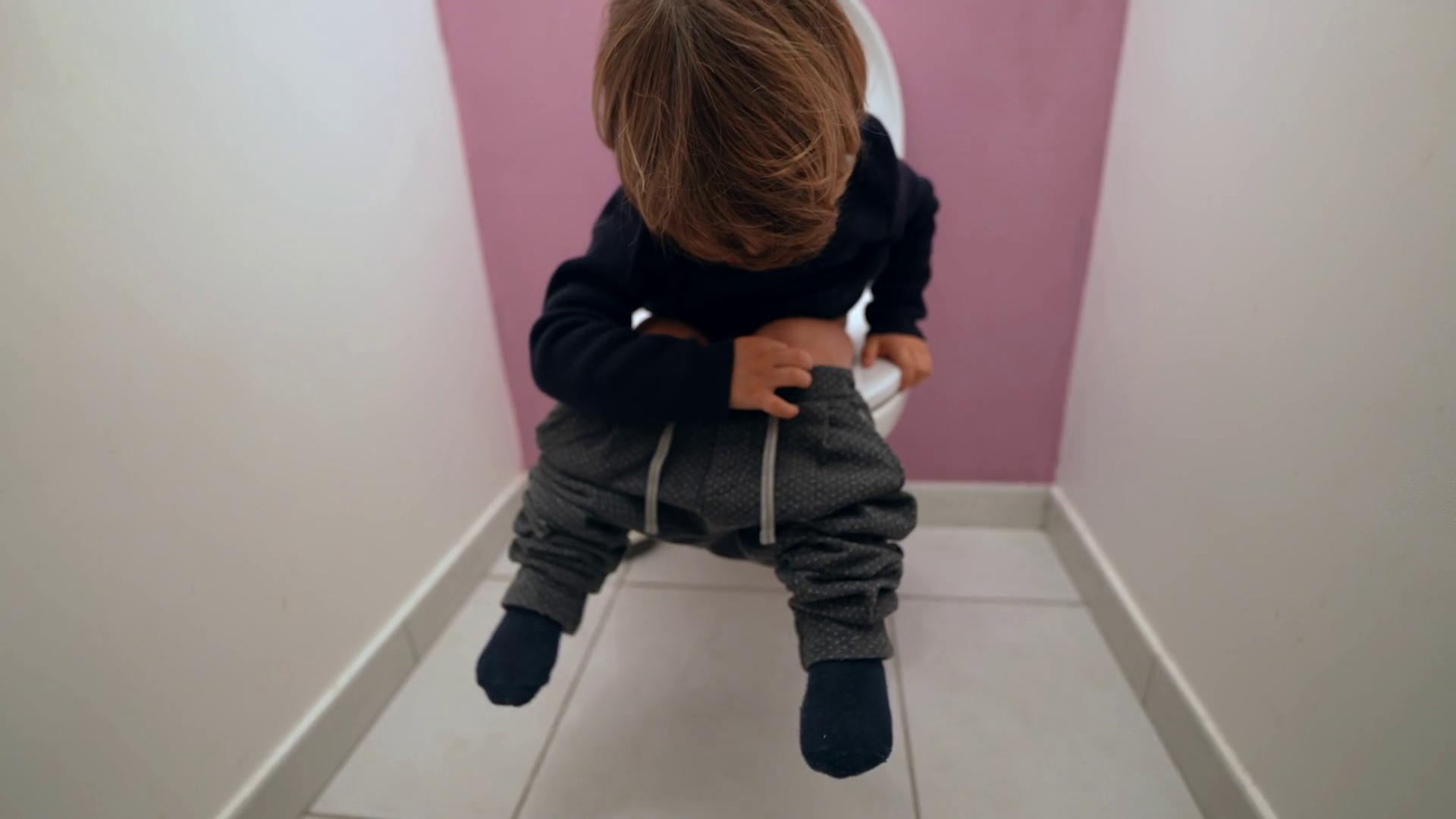 Child Seated In Toilet Inside Bathroom Stock Footage SBV-348683814 ...