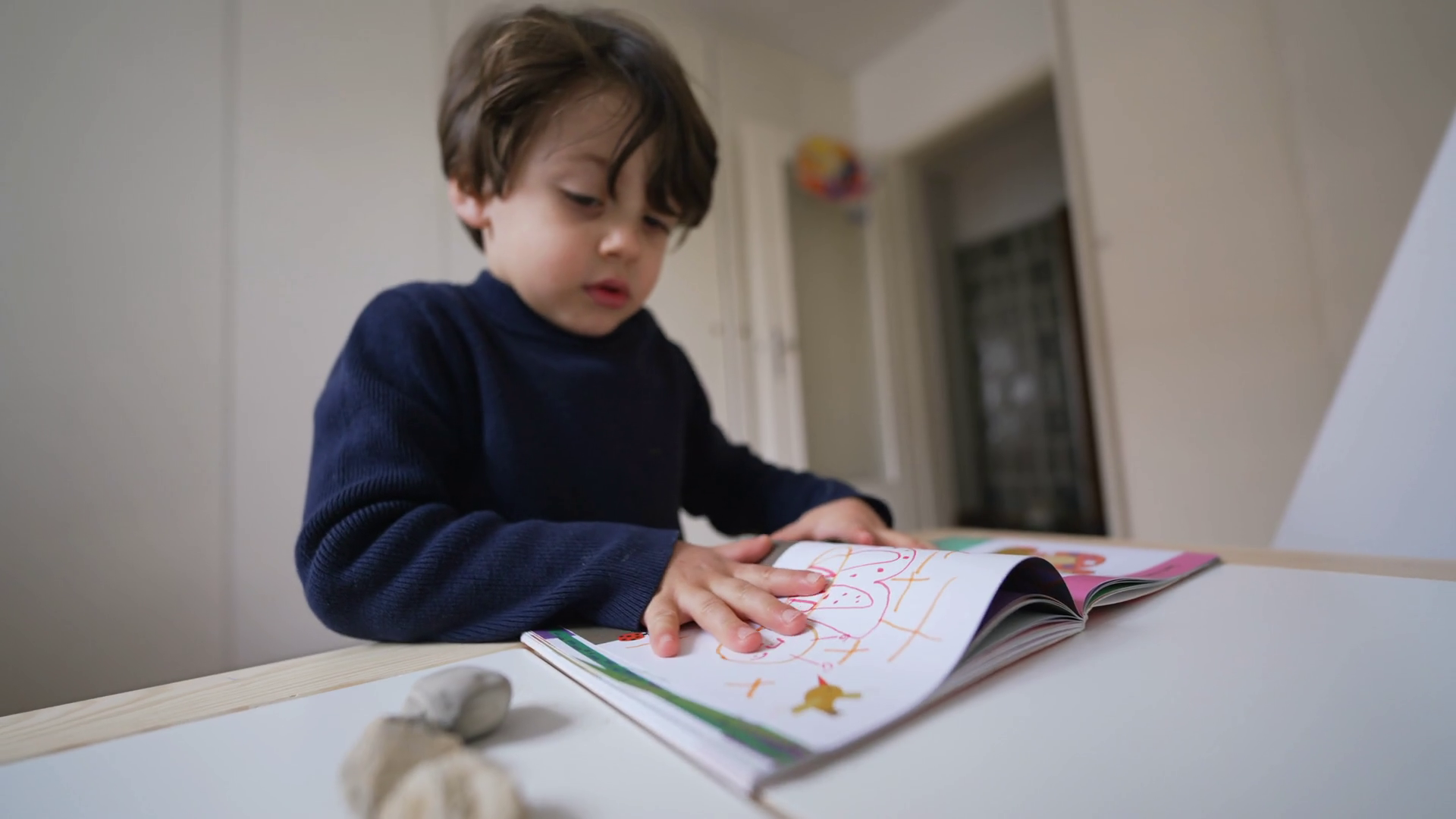 Child Turning Book Pages Looking At Images Stock Footage SBV-348932045 ...