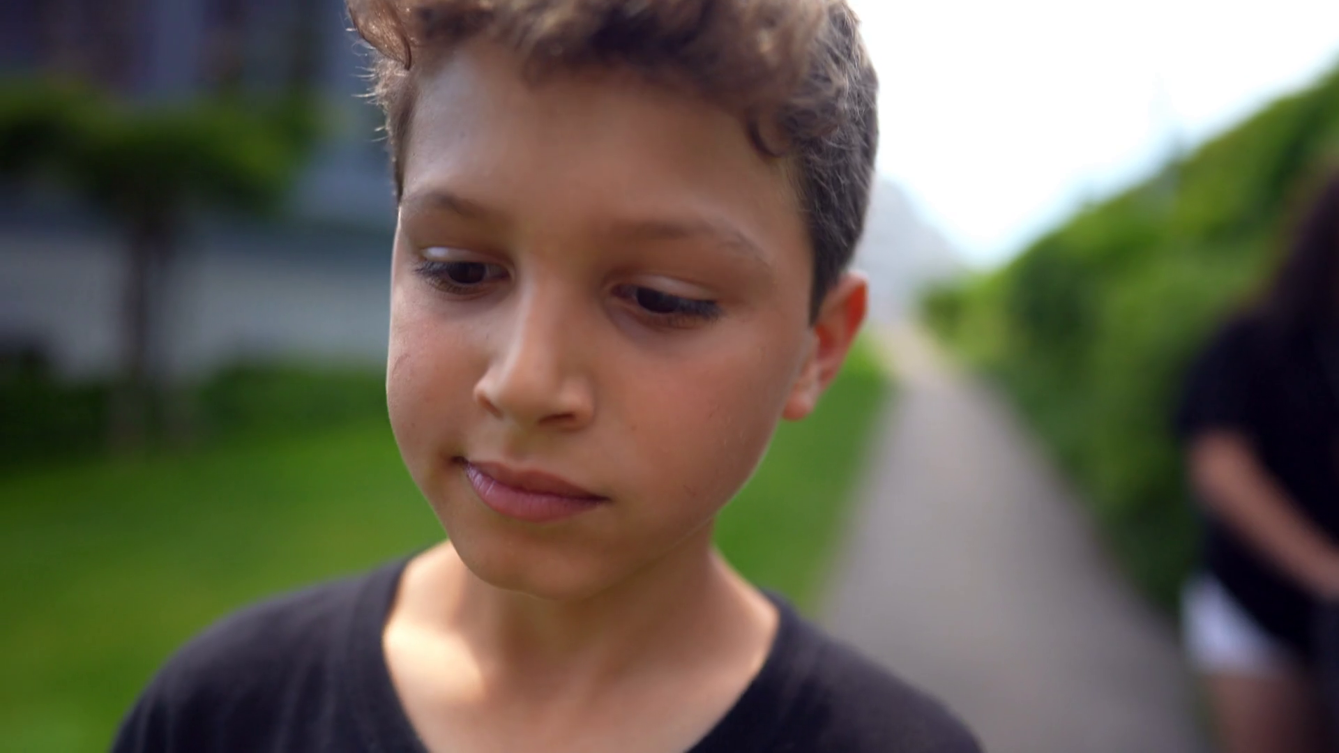 Portrait Of Boy Walking Outside In Park Stock Footage SBV-348848044 ...