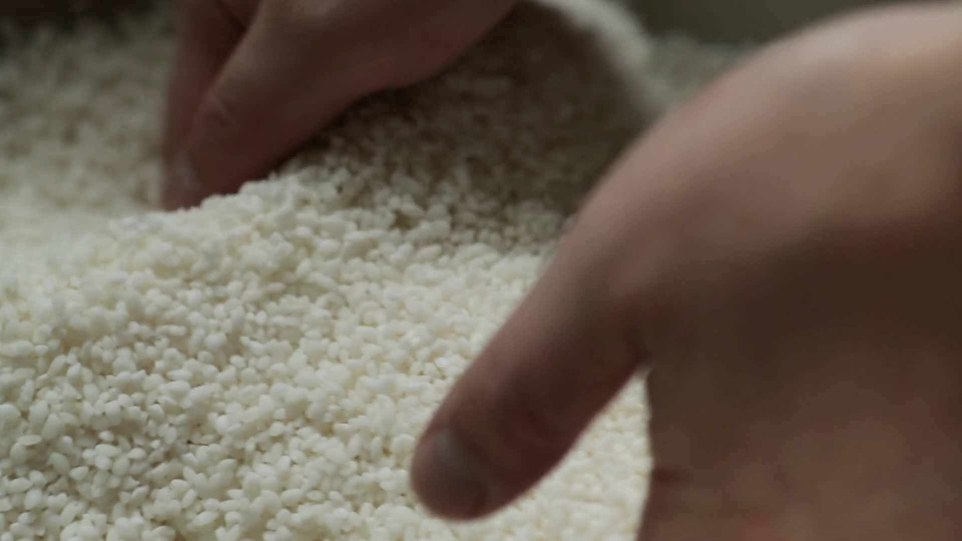 Close Up Of Hand Lifting Rice In Air Stock Footage SBV-348477915 ...