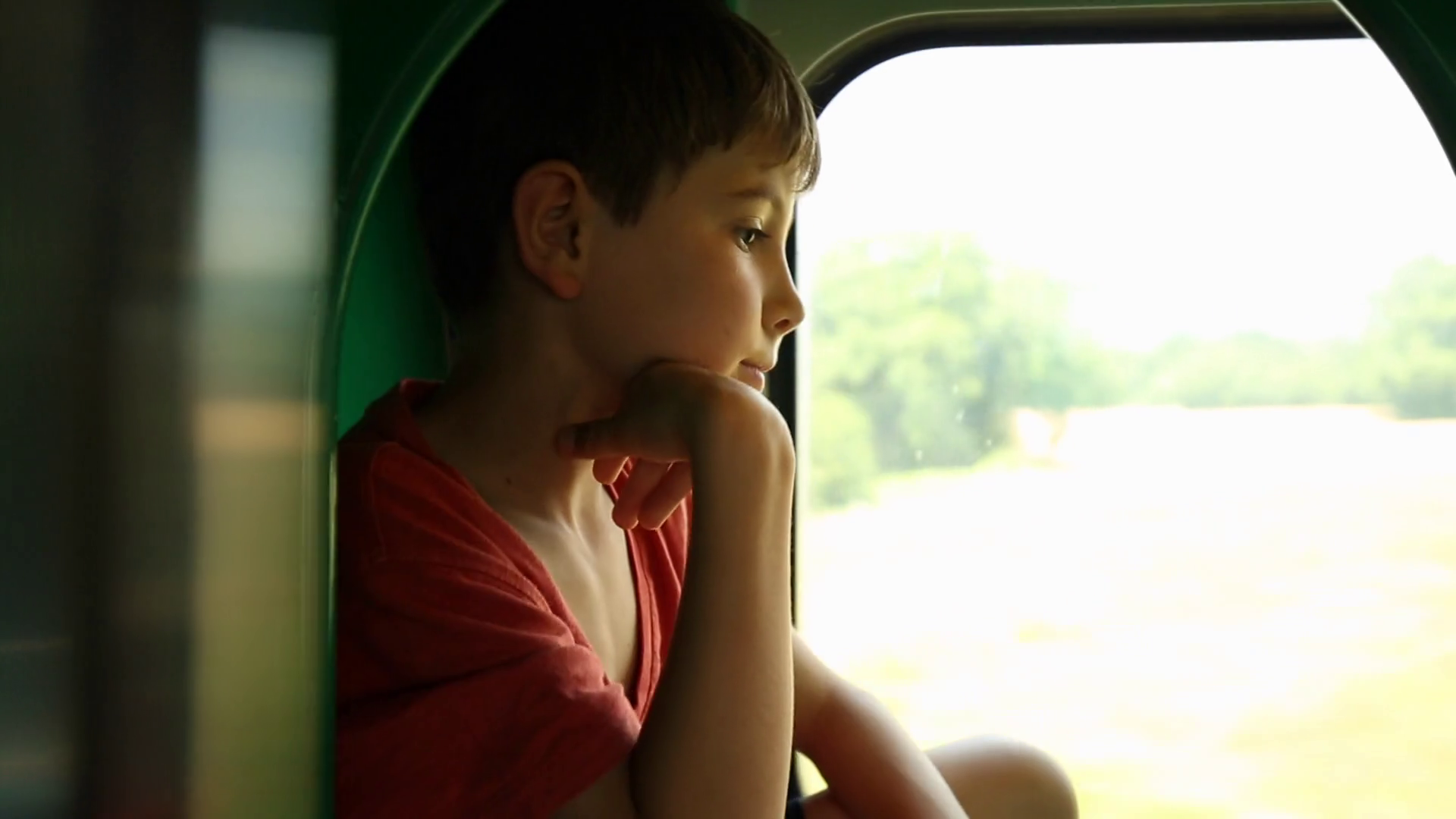 Dreamy Child Gazing Out Train Window Lost In Stock Footage SBV ...