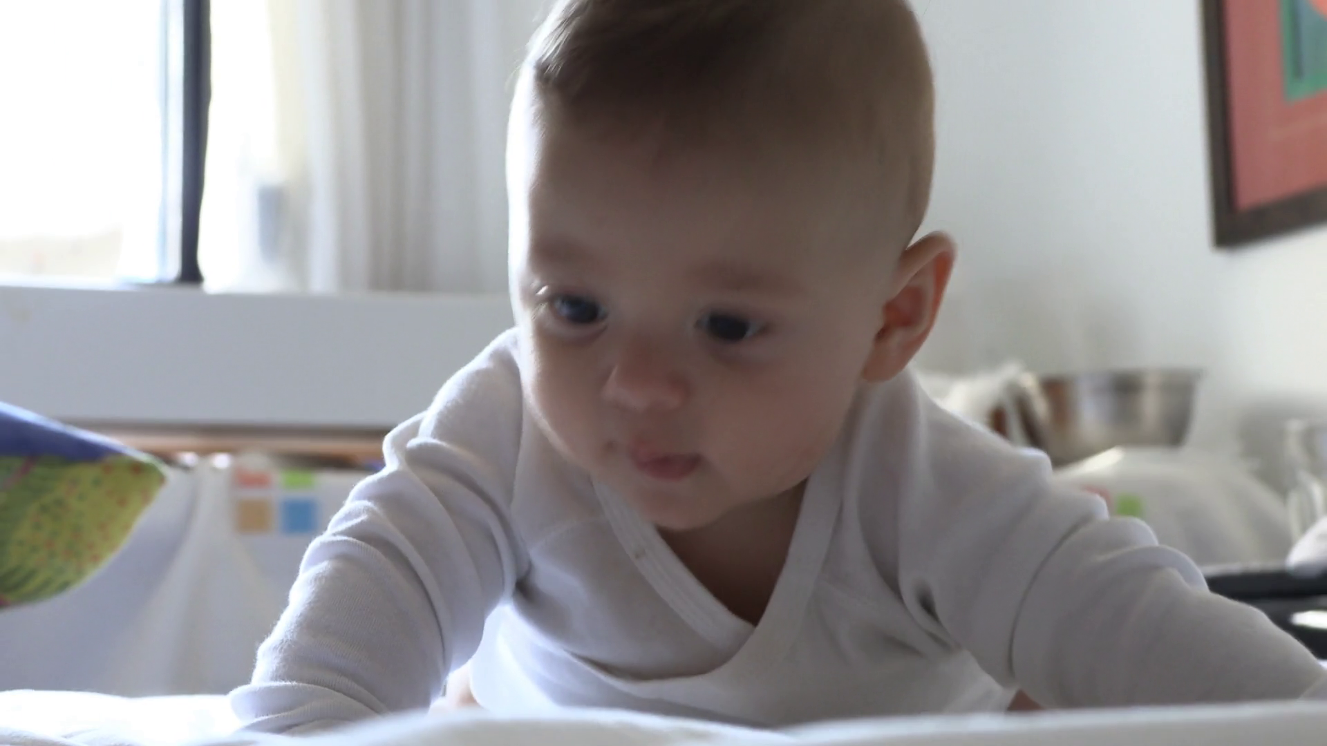 Curious Baby Engaged In Playful Exploration Stock Footage SBV-348411887 ...