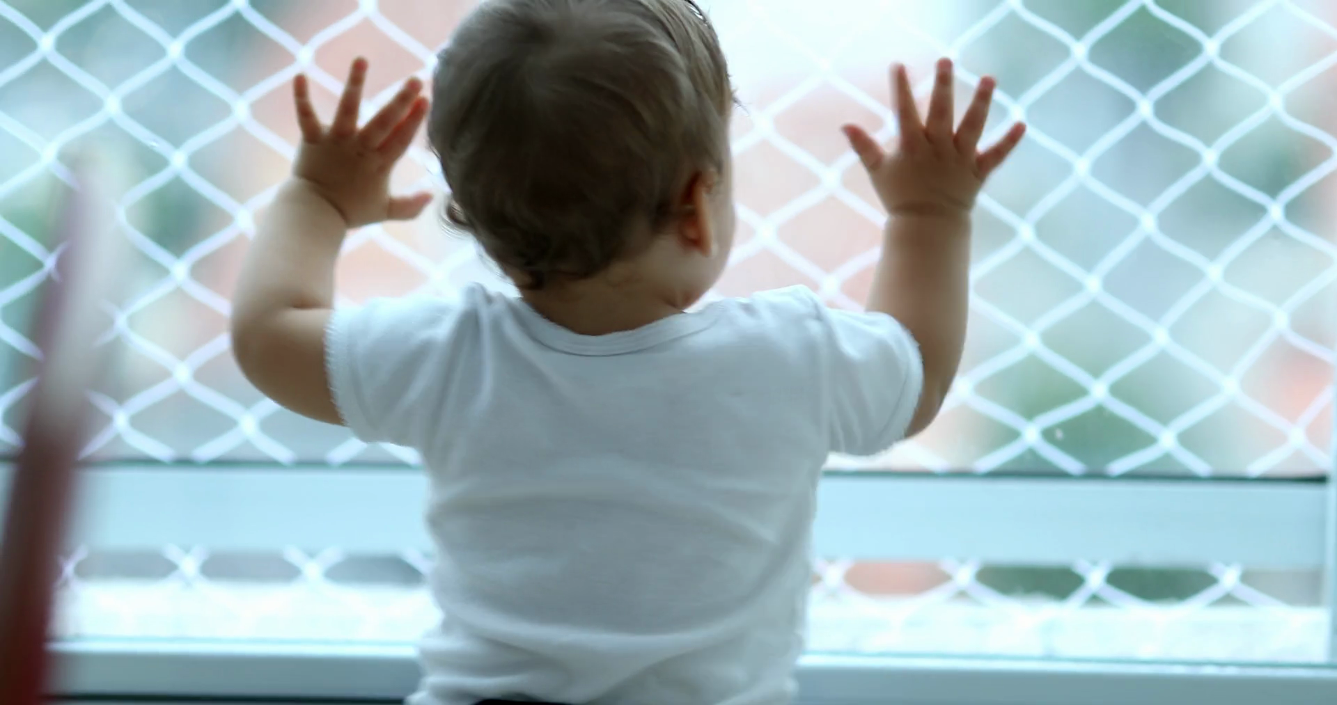 Cute Baby Leaning On Window Looking Outside Stock Footage SBV-348540383 ...