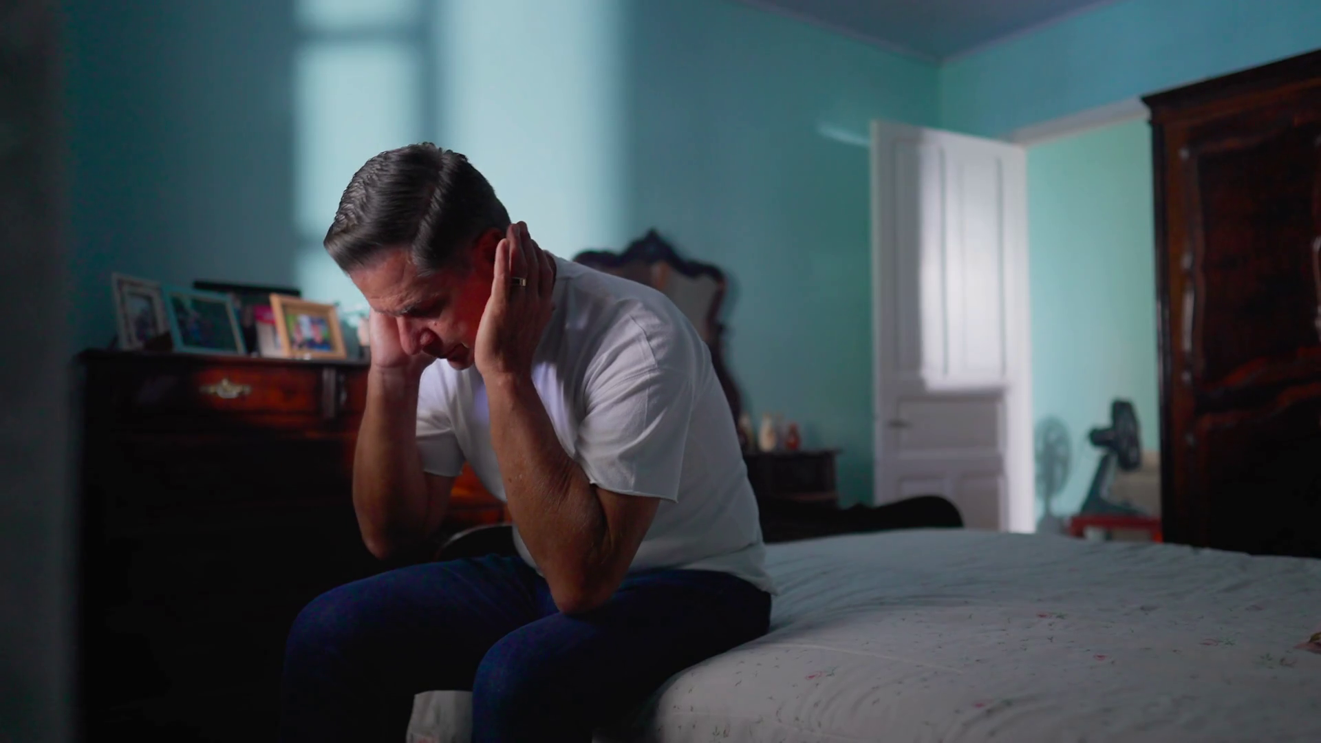 Depressed Man Sitting Bedside In Bedroom Sad Stock Footage SBV ...