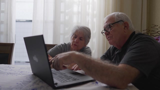 Seniors Using Computers Stock Footage: Royalty-Free Video Clips ...