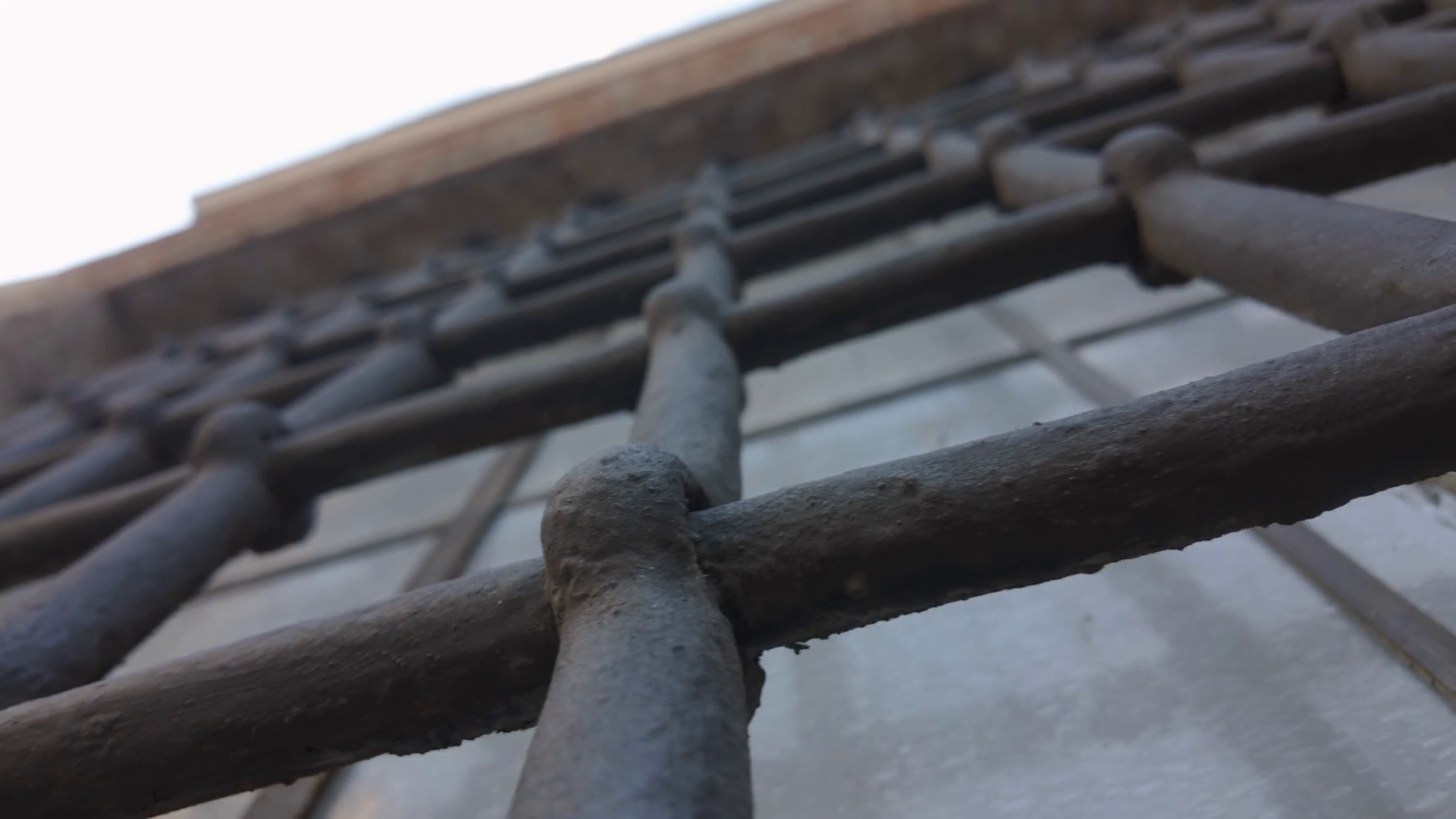 Extreme Low Angle Of Metal Bars On Historic Stock Footage SBV-352584924 ...
