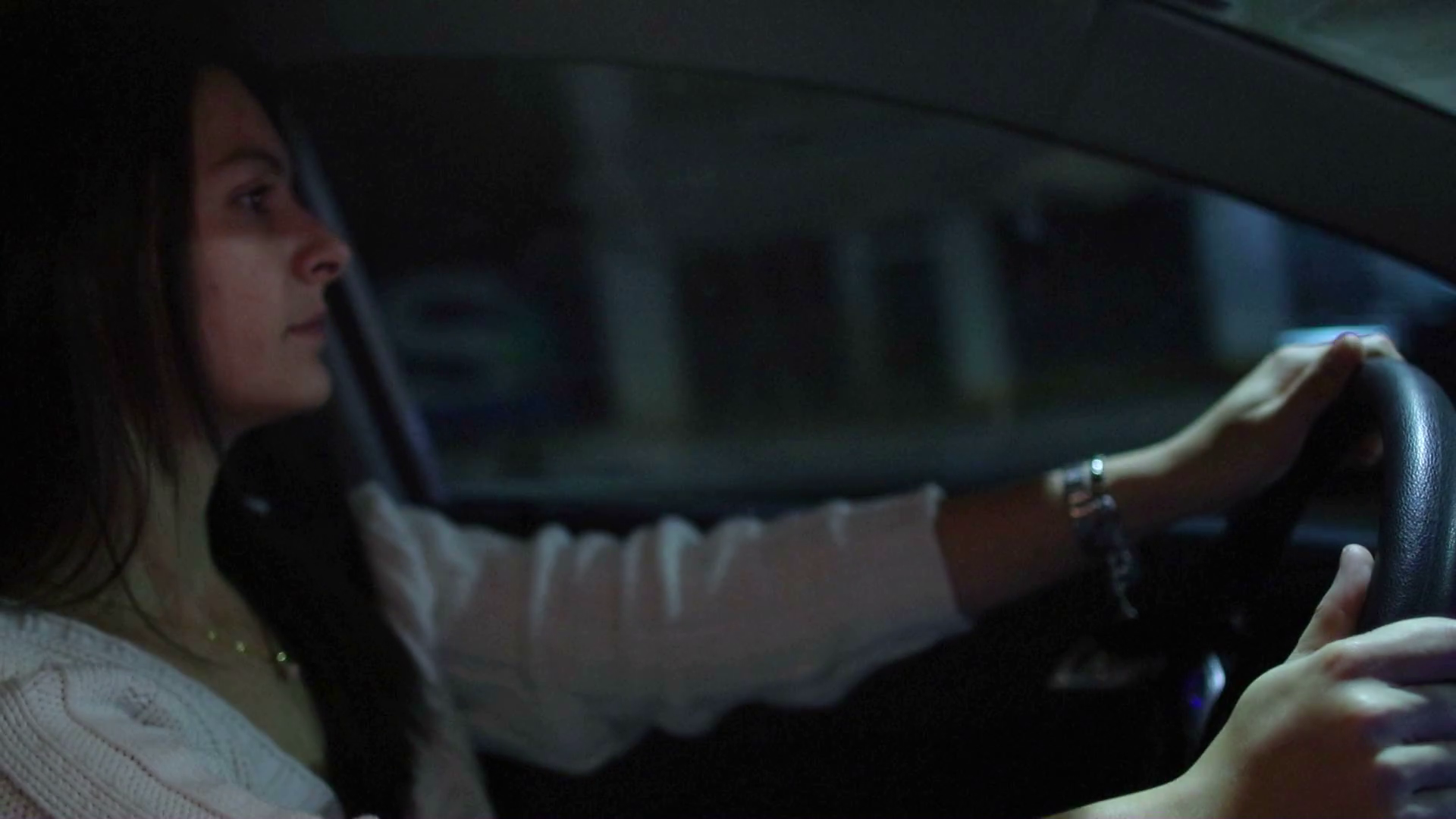 Night Drive: 30s Woman Navigating Road Stock Footage SBV-348435138 ...