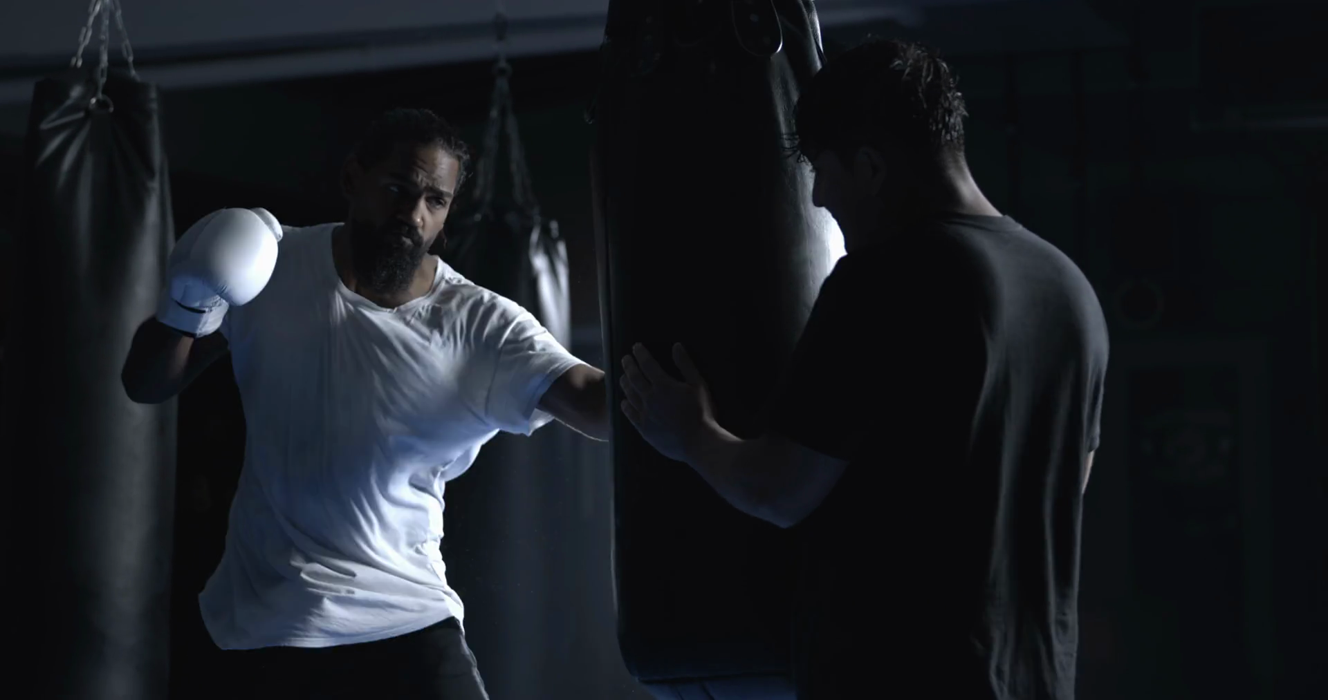 Fighter Punching Kicking Punching Bag In Stock Footage SBV-348625755 ...