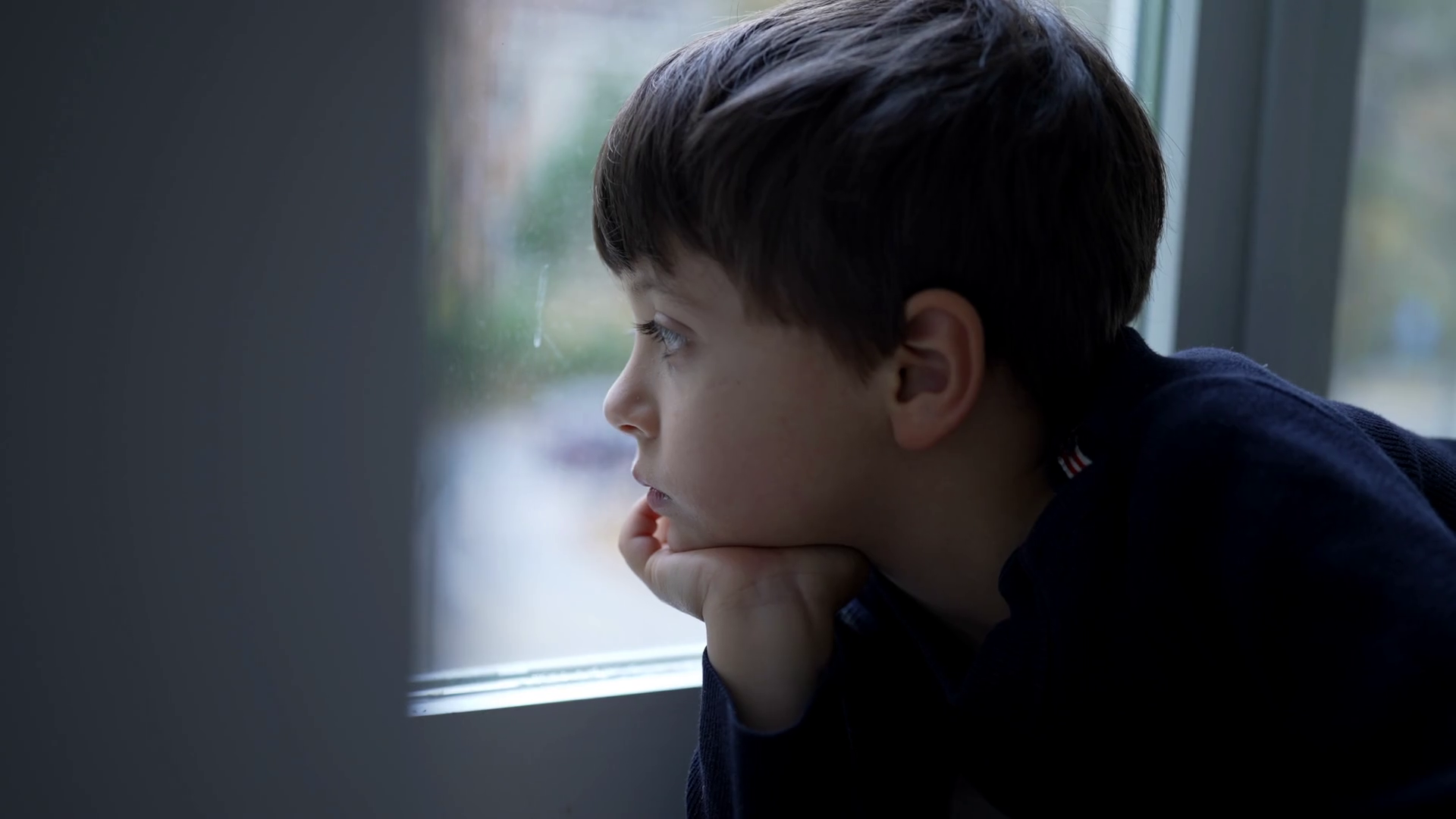 Pensive Child With Hand In Chin Gazing At Stock Footage SBV-348718410 ...