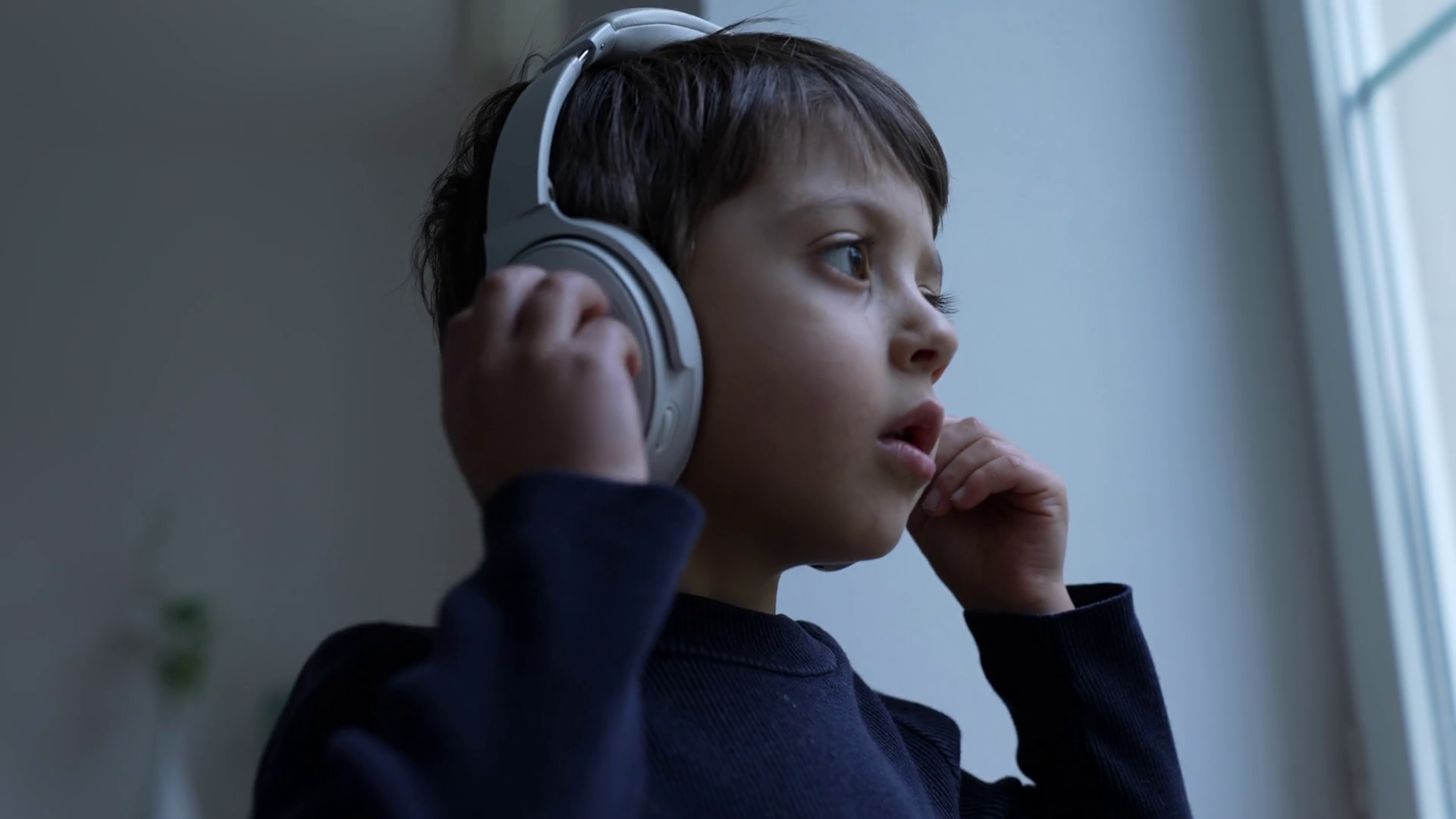 One Small Boy Wearing Headphones Standing Stock Footage SBV-348718560 ...