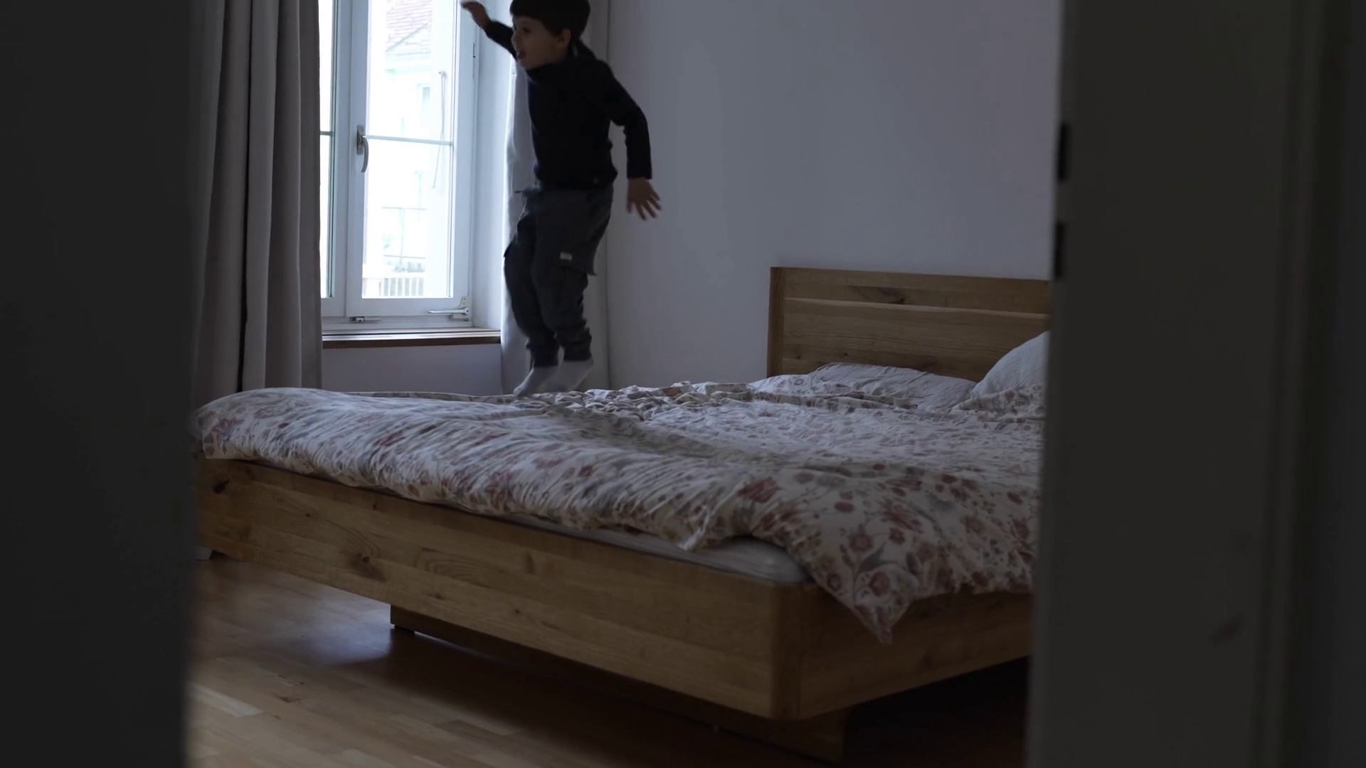 Child Bouncing Up Down On Top Of Bed Candid Stock Footage SBV-348718387 ...