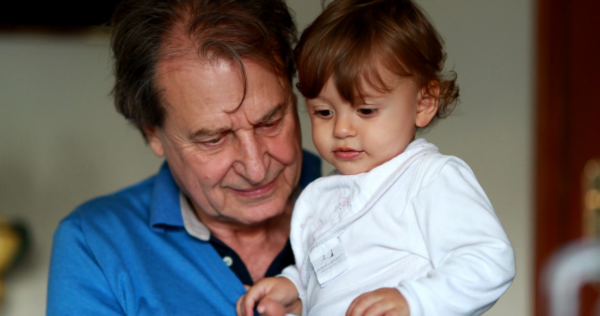 Grandfather Holding Grandson Baby In Lap Stock Footage SBV-348548606 ...