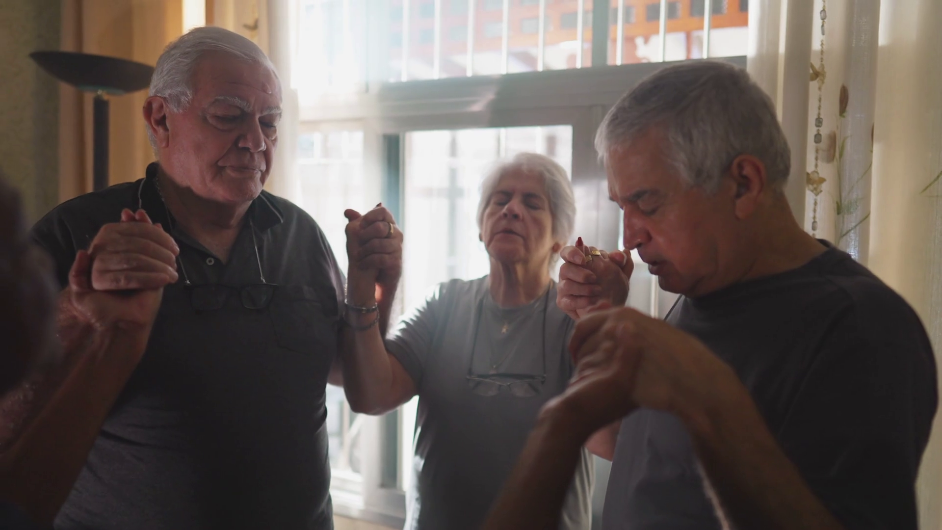Faithful Elderly Group Praying At Home With Stock Footage SBV-348614682 ...
