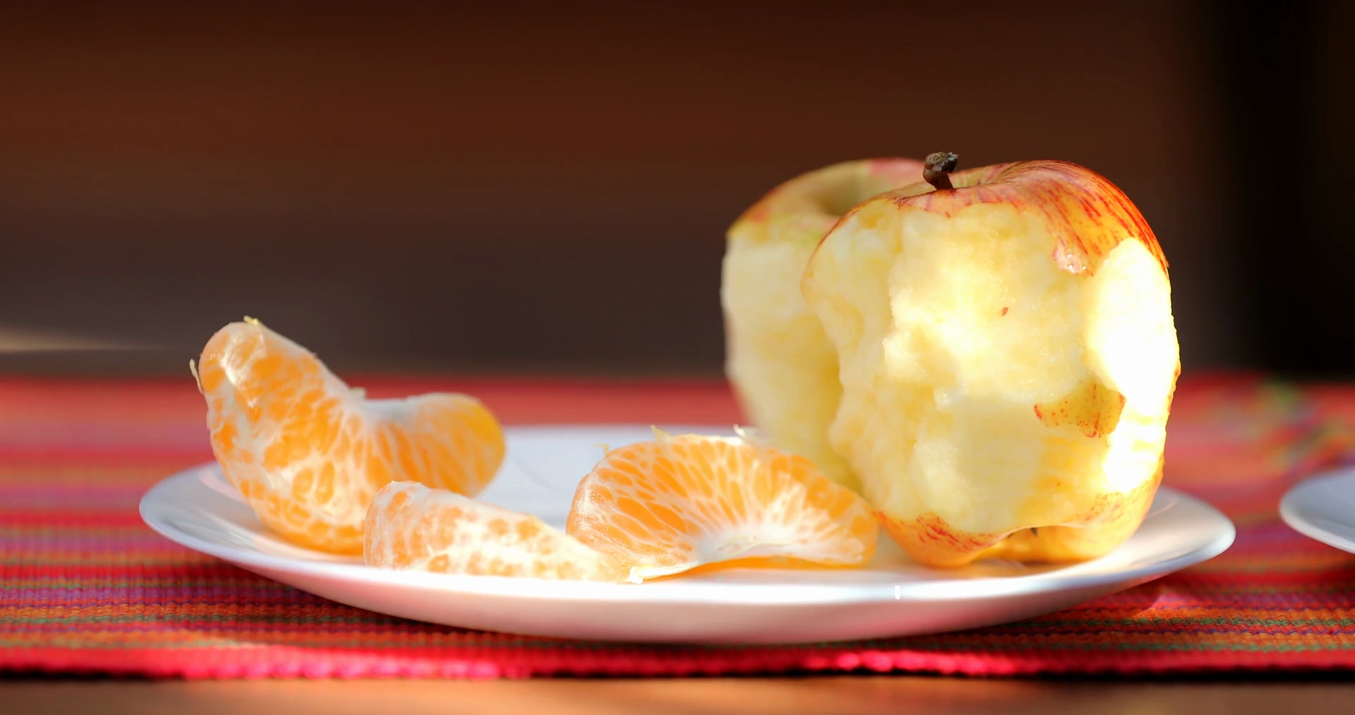 Half Eaten Apple On Plate Outside With Stock Footage SBV-348780922 ...