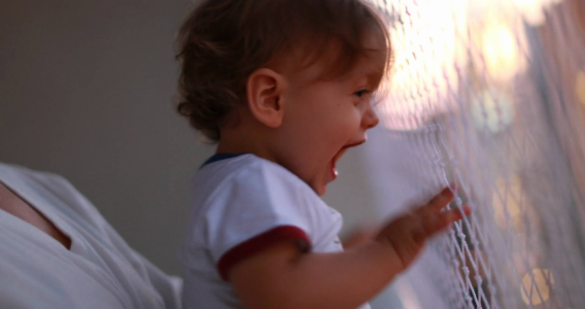 Happy Baby Touching Safety Net At Balcony Stock Footage SBV-348545619 - Storyblocks