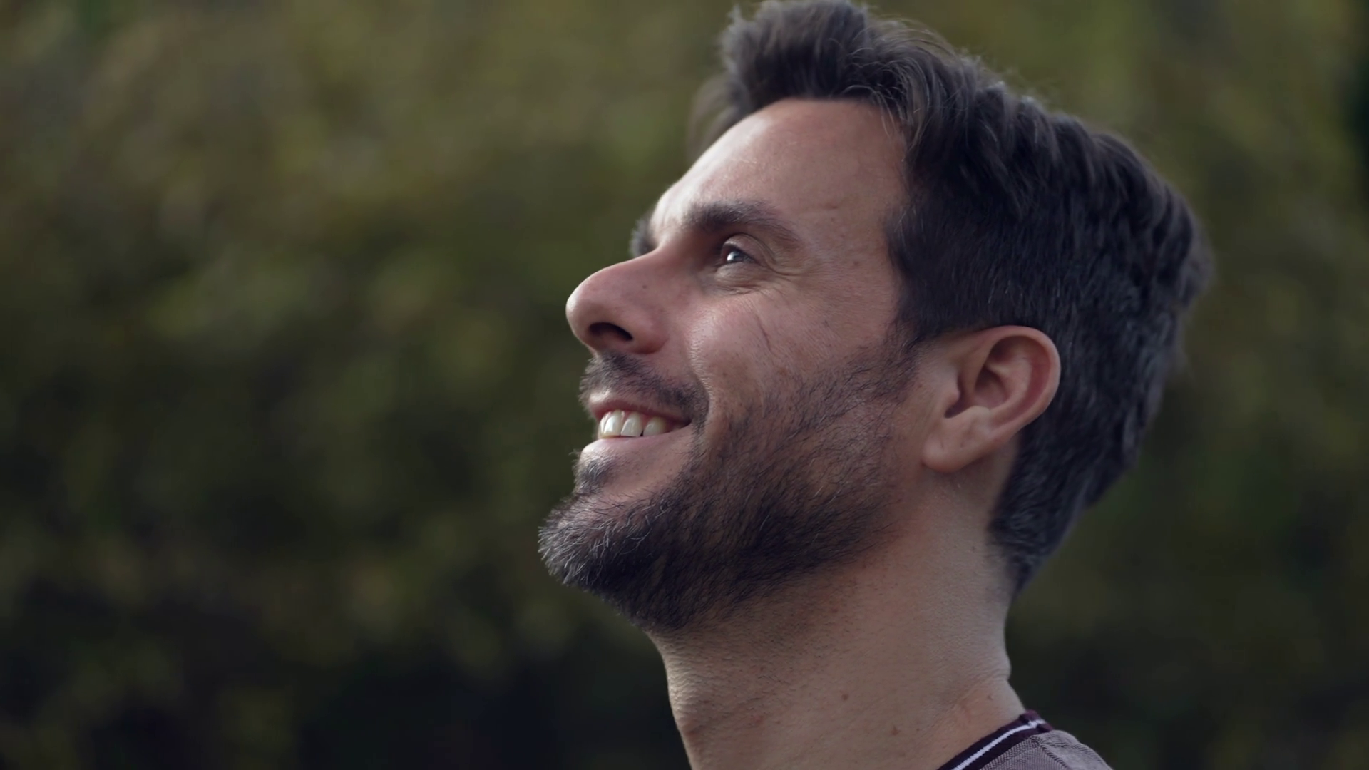 Joyful Skyward Gaze: Closeup Of Smiling Stock Footage SBV-348408236 ...