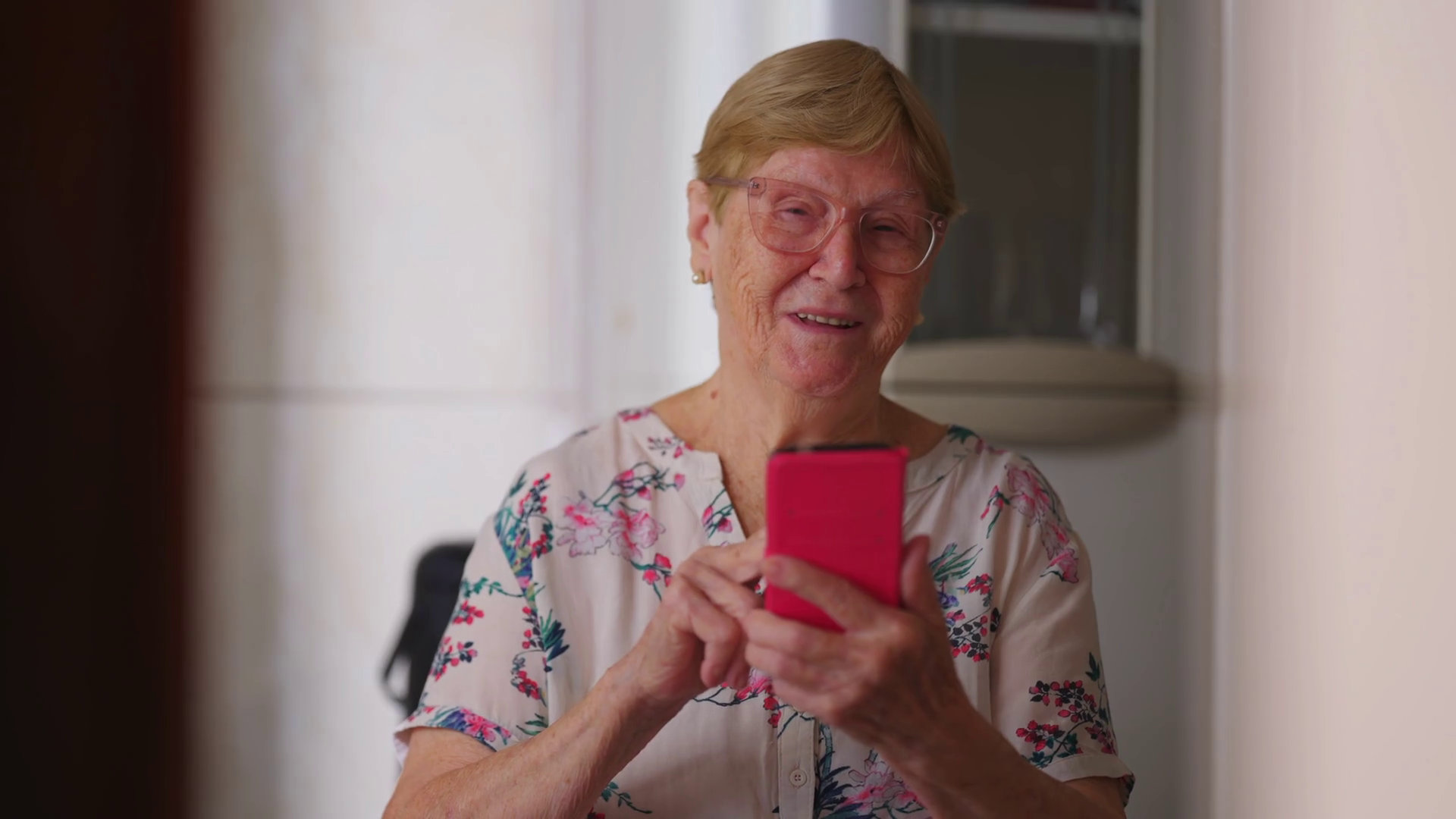 Happy Senior Woman Holding Smartphone Device Stock Footage SBV ...