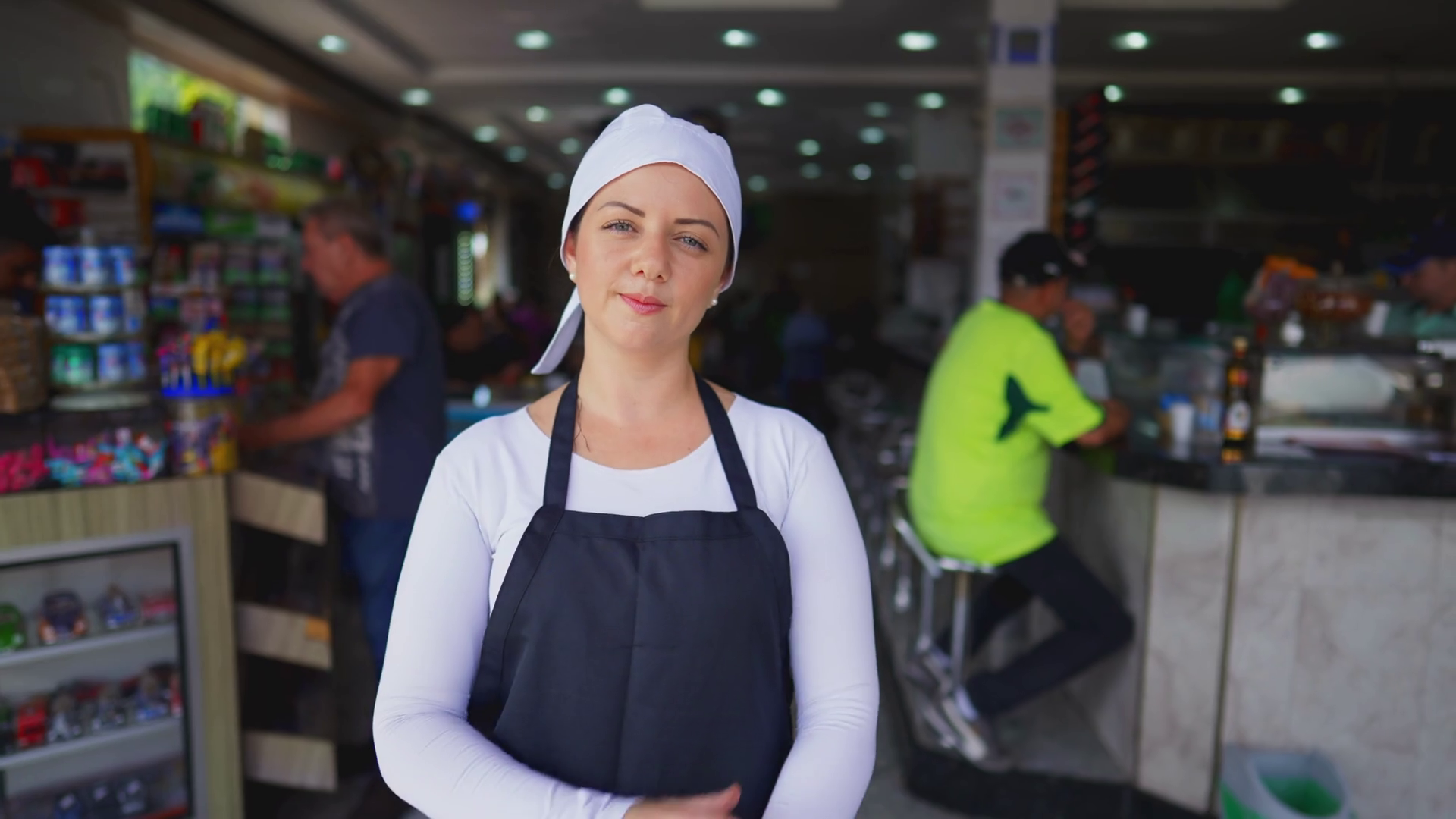 Joyful Waitress With Arms Crossed Smiling In Stock Footage SBV ...