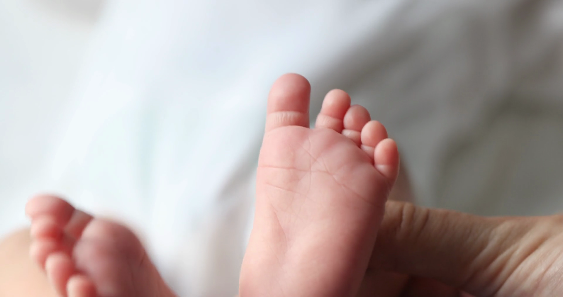 Tender Connection: Holding Newborn Baby's Stock Footage SBV-348430657 ...