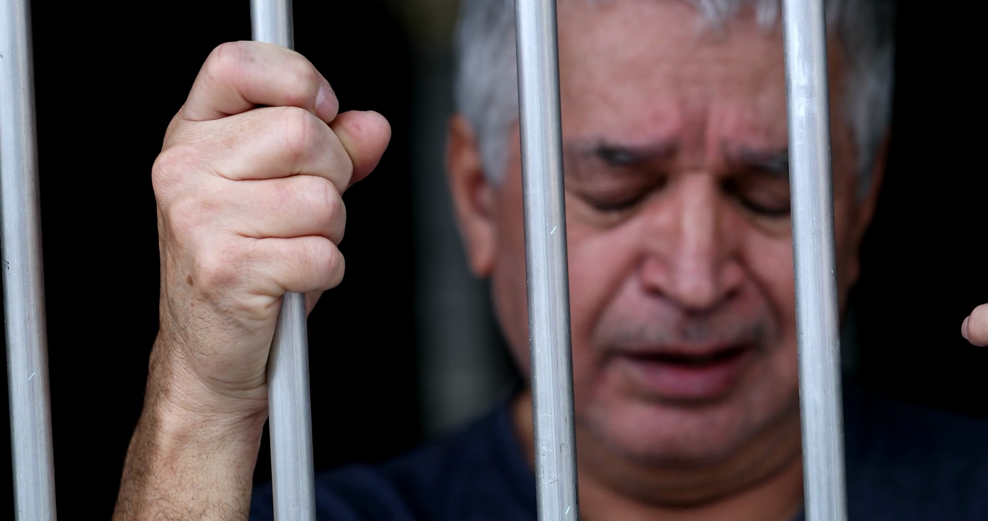 Imprisoned Older Man Behind Bars Crying Stock Footage SBV-348710046 ...