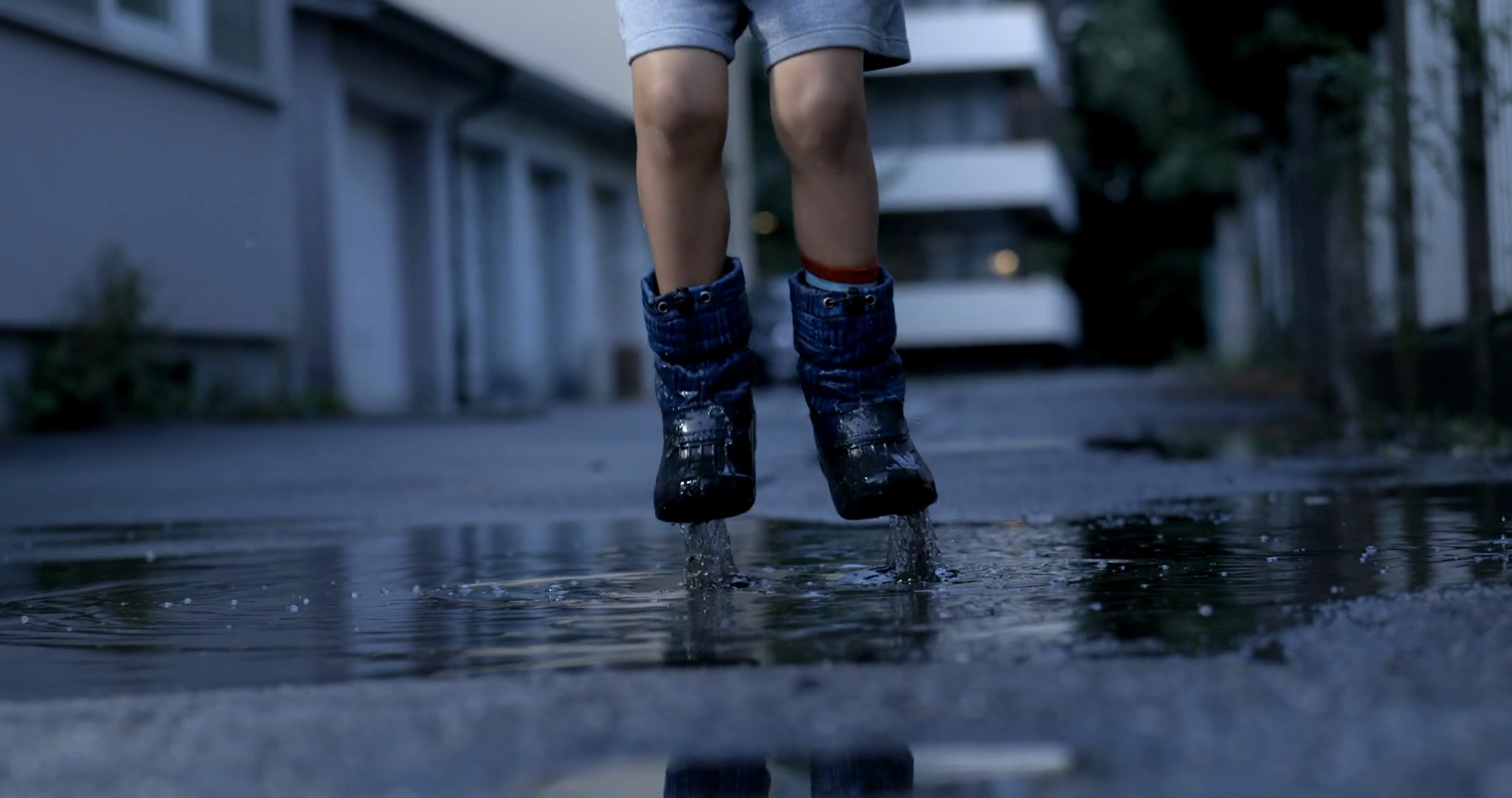 Joyful Leap Kid Jump In Air Into Puddle Slow Stock Footage SBV-348820511 - Storyblocks