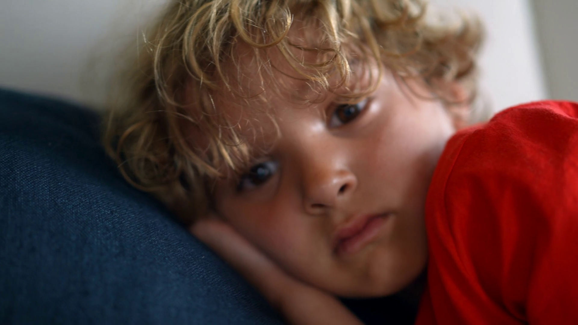 Little Boy Close Up Face Lying On Sofa Stock Footage SBV-348849524 ...