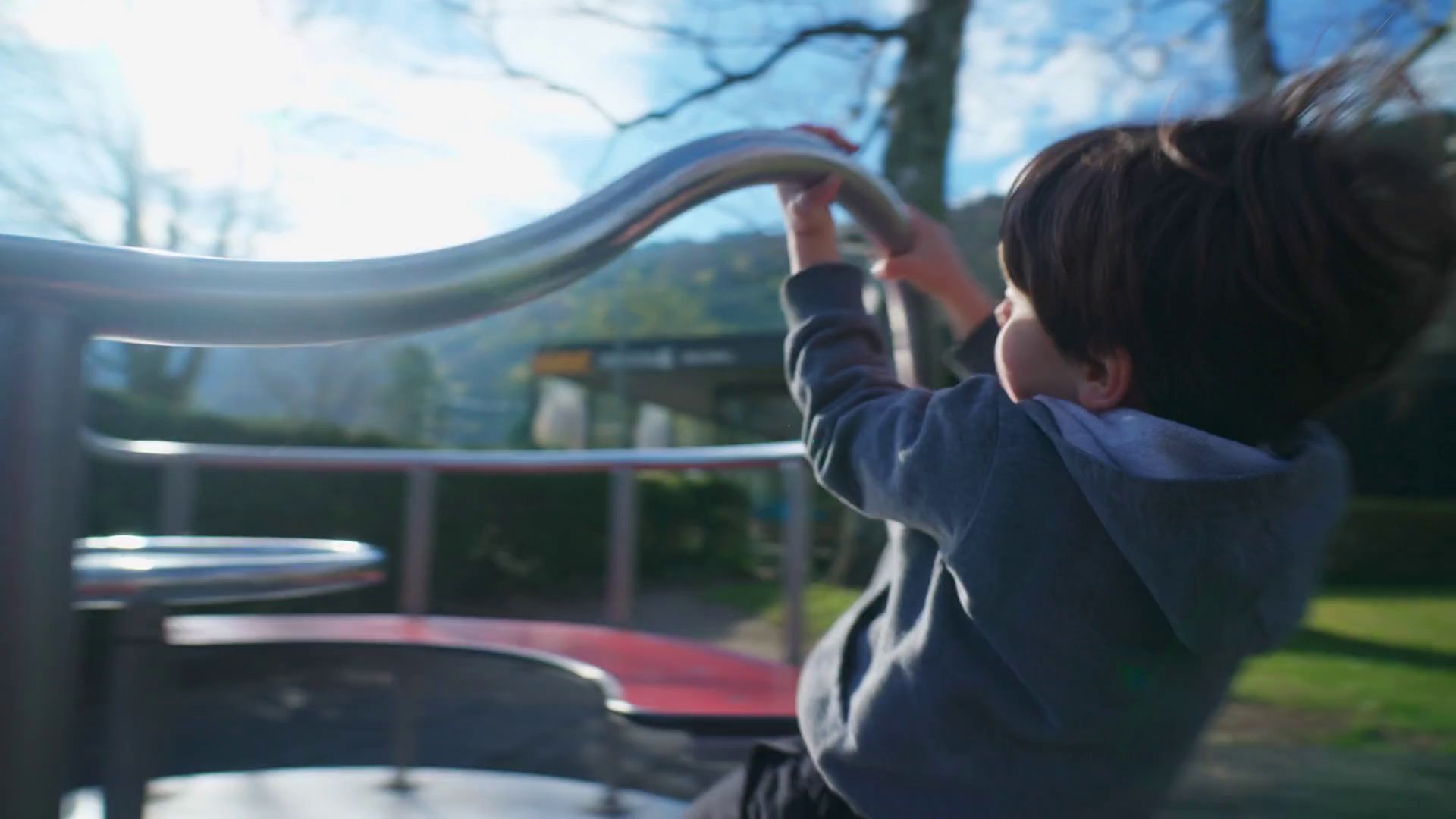 Carousel Joy: Little Boy Gleefully Whirling Stock Footage SBV-348422895 ...