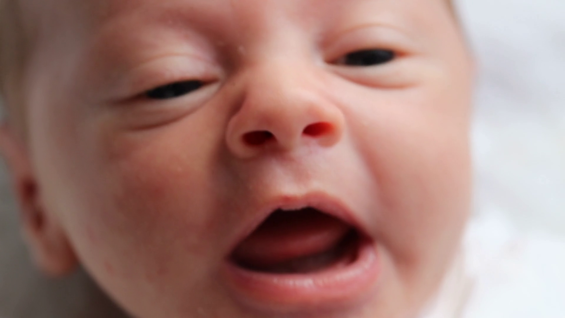 Tiny Newborn Baby Sneezing Closeup Of Stock Footage SBV-348430925 ...