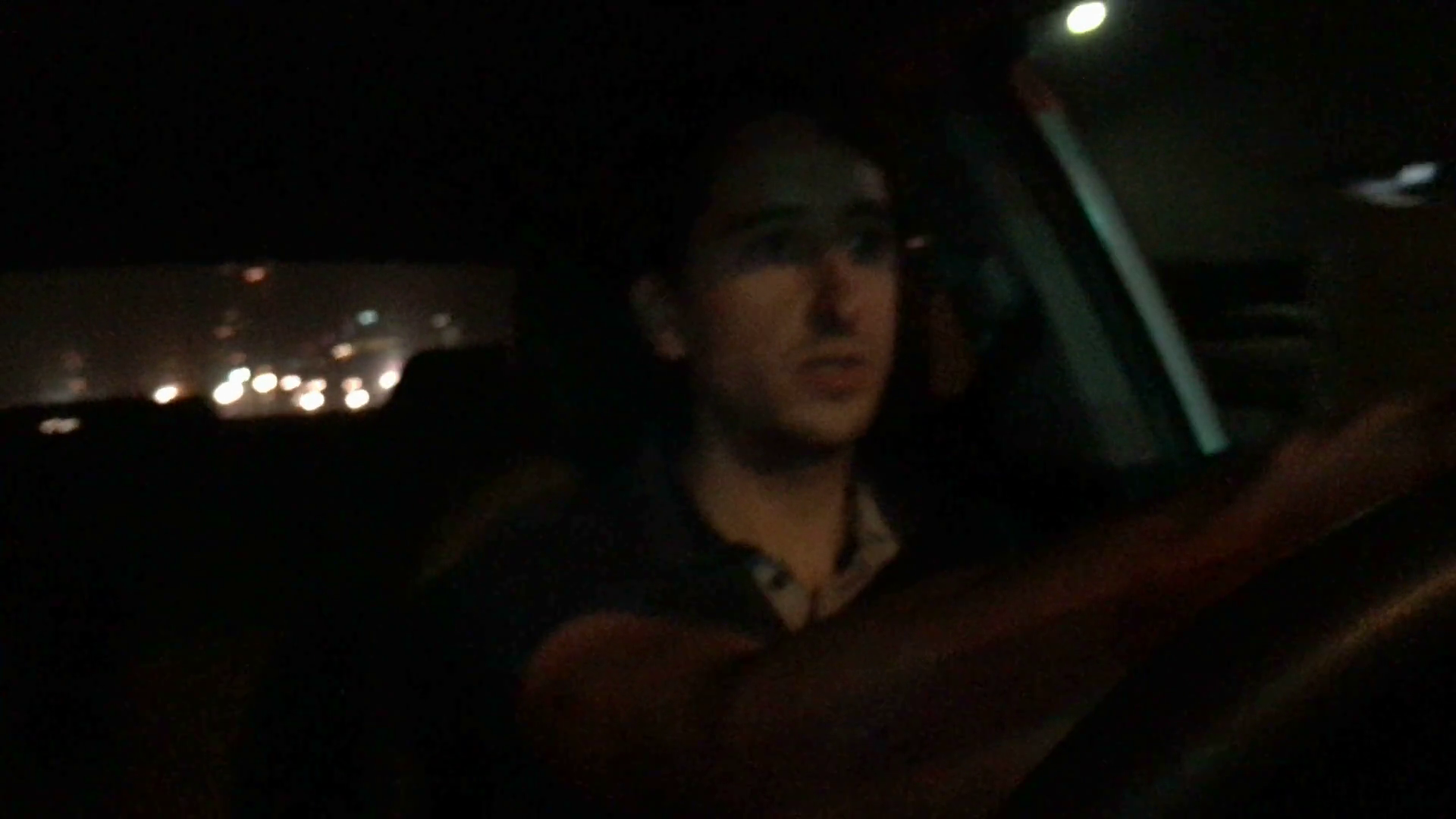 Night Drive: Man's Close-up Face Holding Stock Footage SBV-348439582 ...
