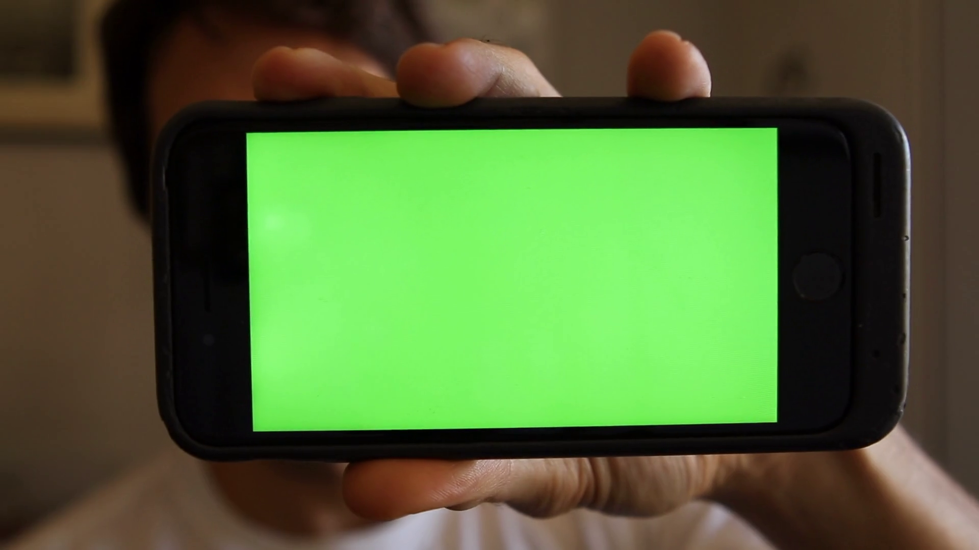 Man Holding Cellphone Green Screen Person Stock Footage SBV-348477436 ...