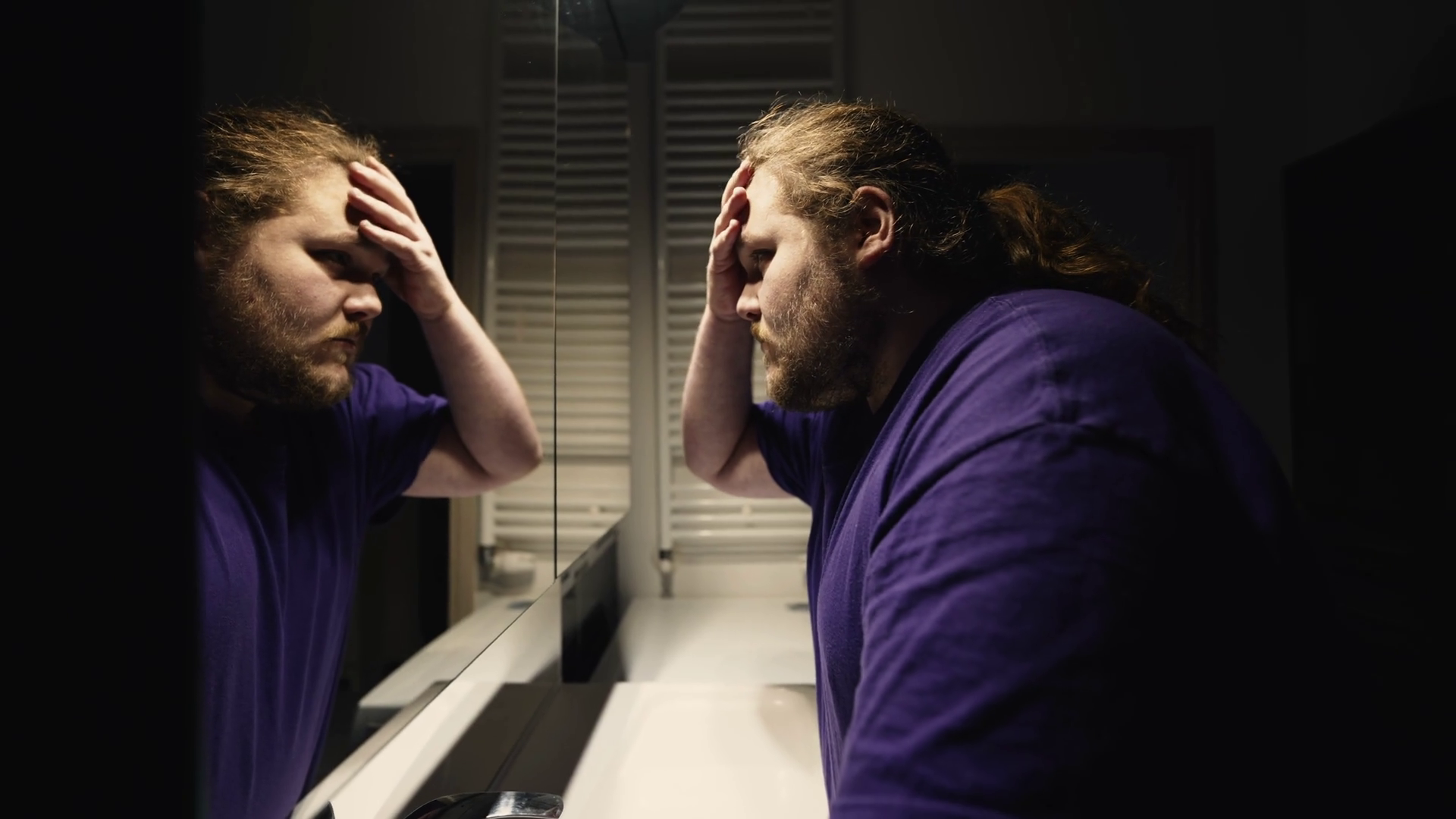 Solitary Struggle: Man Leaning On Bathroom Stock Footage SBV-348439511 ...