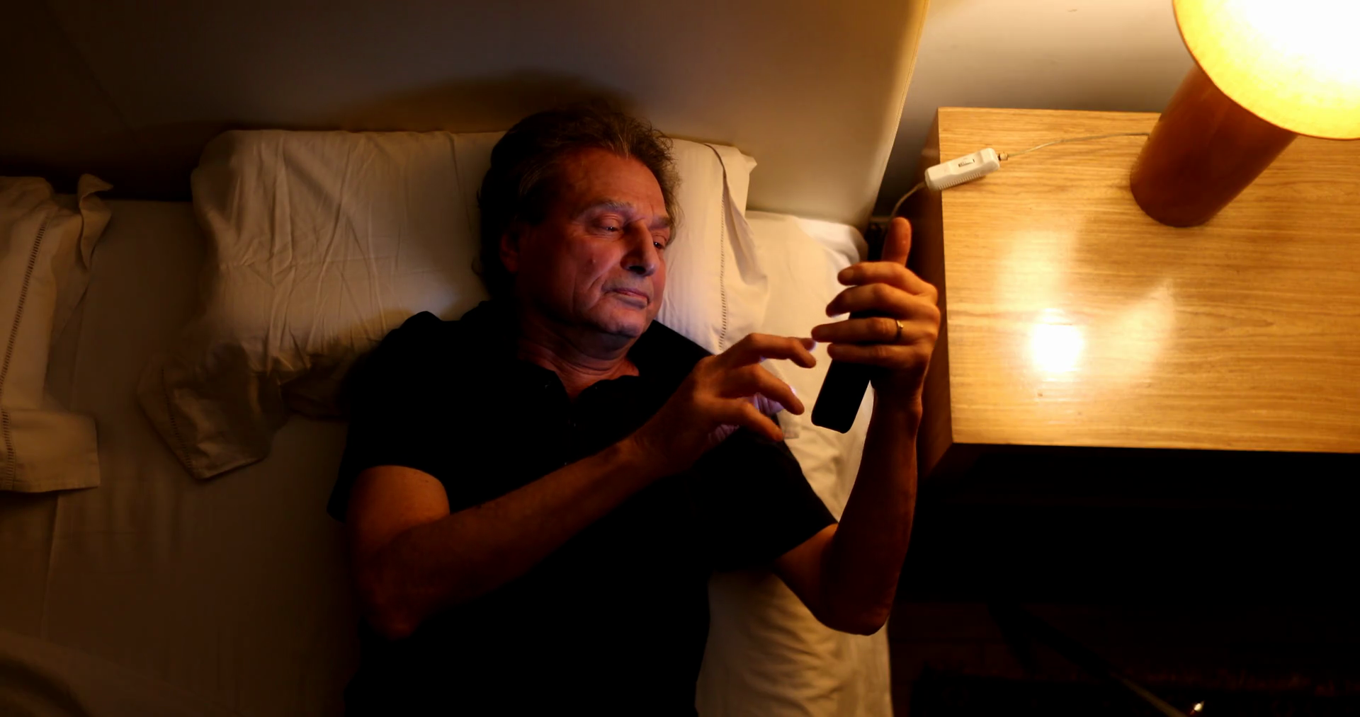 Senior Man Turning Off Phone Nightstand Lamp Stock Footage SBV ...