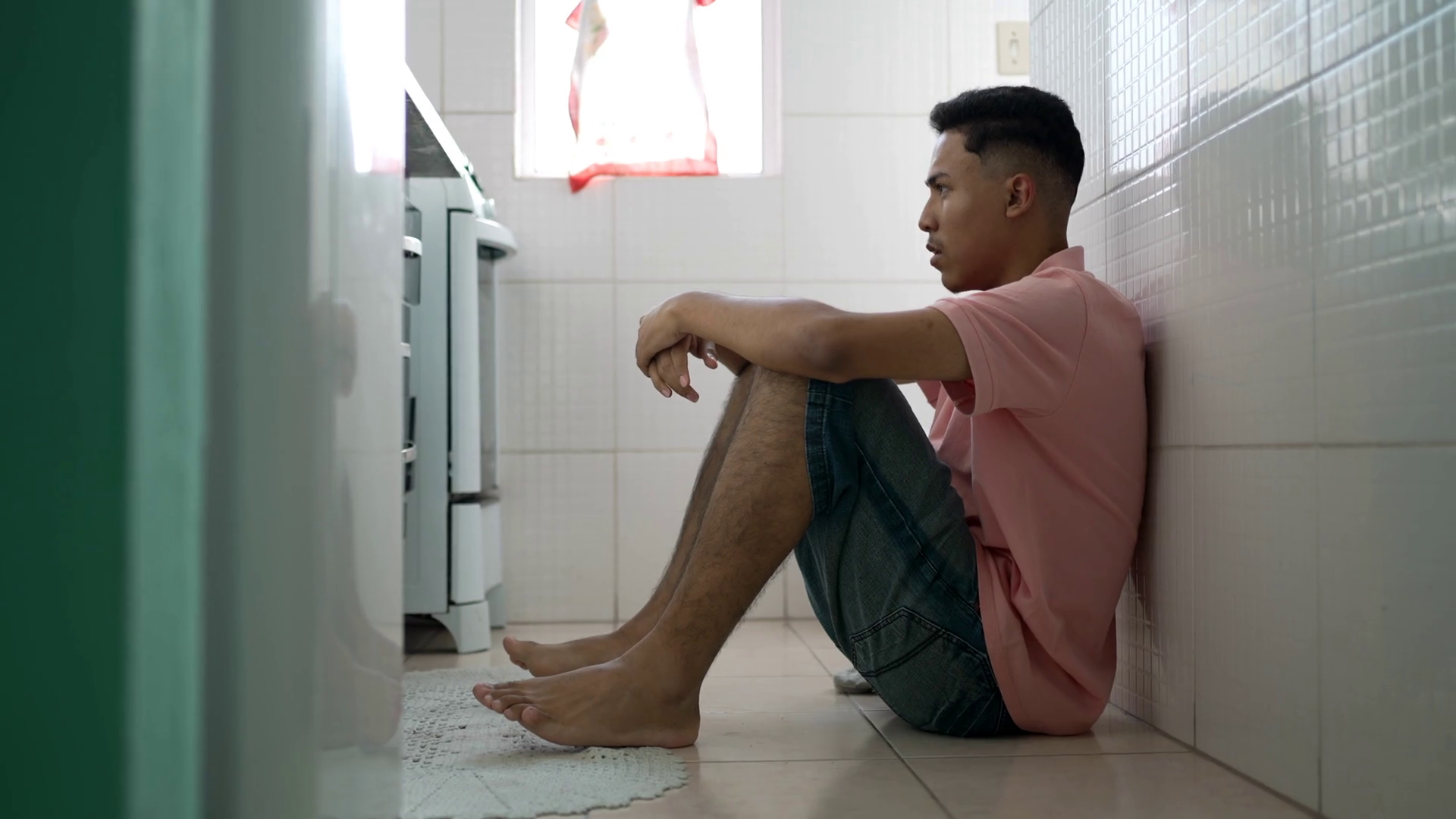 Solitary Struggle: Hispanic Young Man Sits Stock Footage SBV-348389603 ...