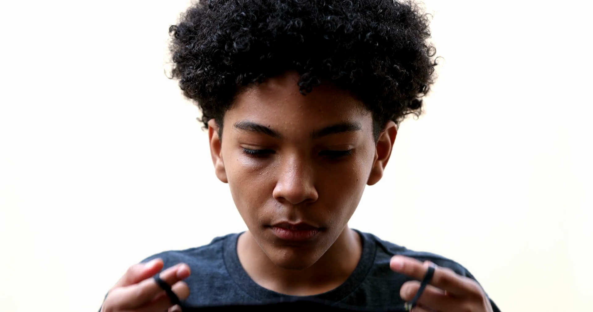 Mixed Race Kid Putting Covid 19 Face Mask On Stock Footage SBV ...