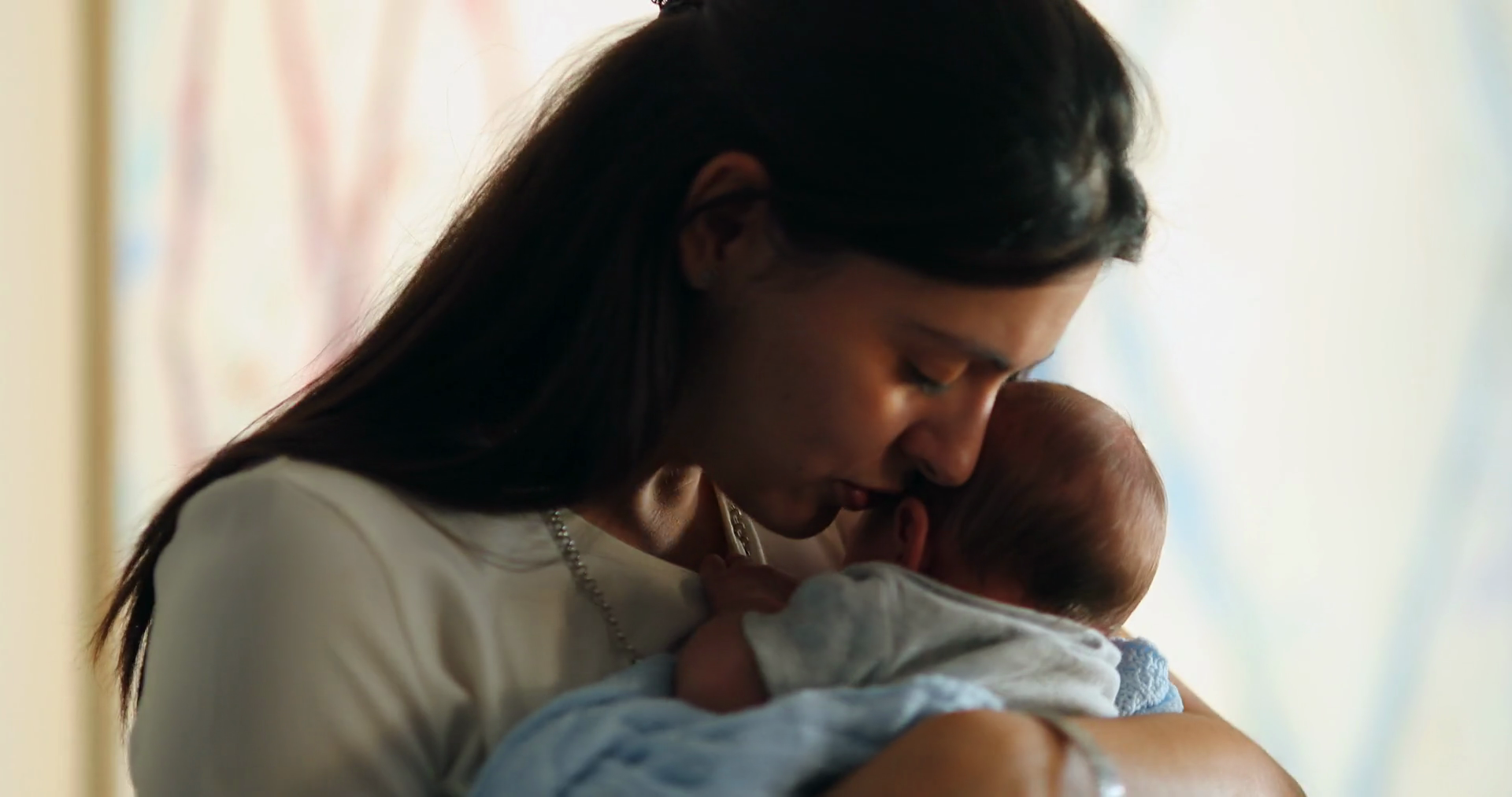Soothing Love: Mother Calming Newborn Baby Stock Footage SBV-348432050 - Storyblocks