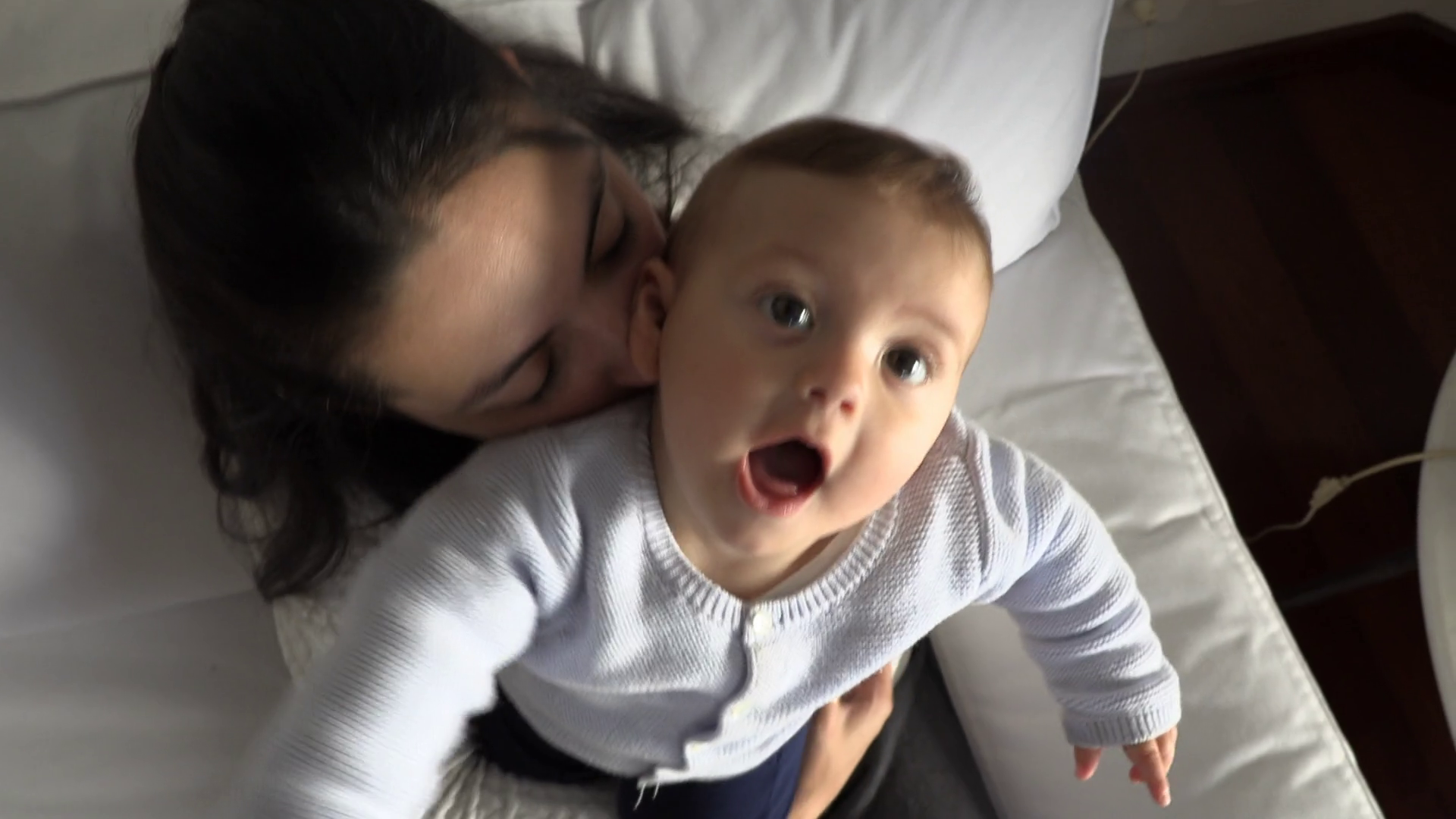 From Above: Mother Kissing Snuggling Stock Footage SBV-348419385 ...