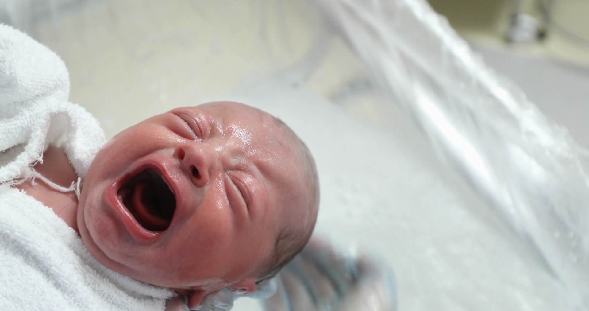 Gentle Cleanse: Newborn Baby Bath Washing Stock Footage SBV-348433498 ...
