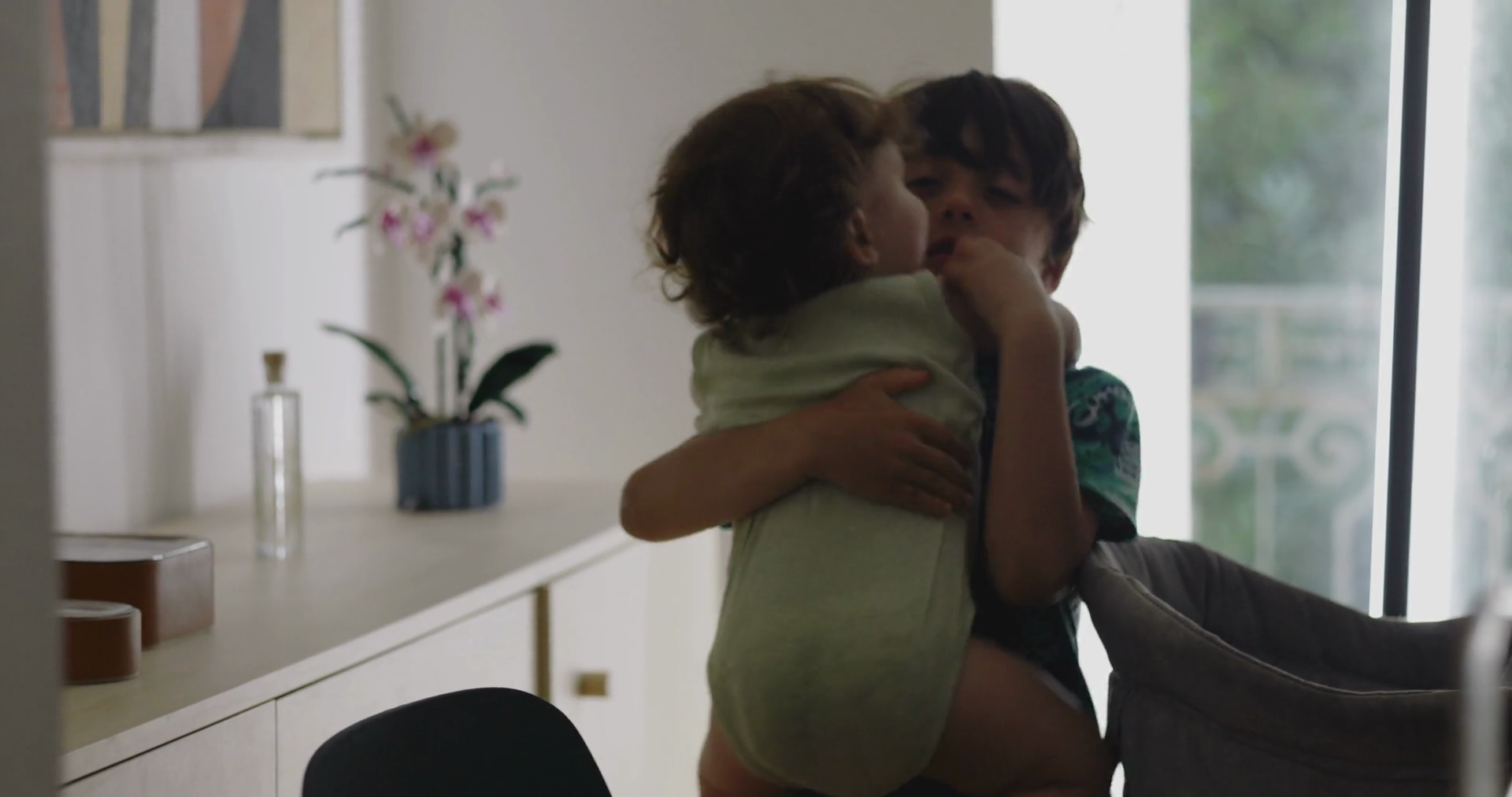 Older Brother Lifts Holds Baby Sibling In Stock Footage SBV-353253348 ...