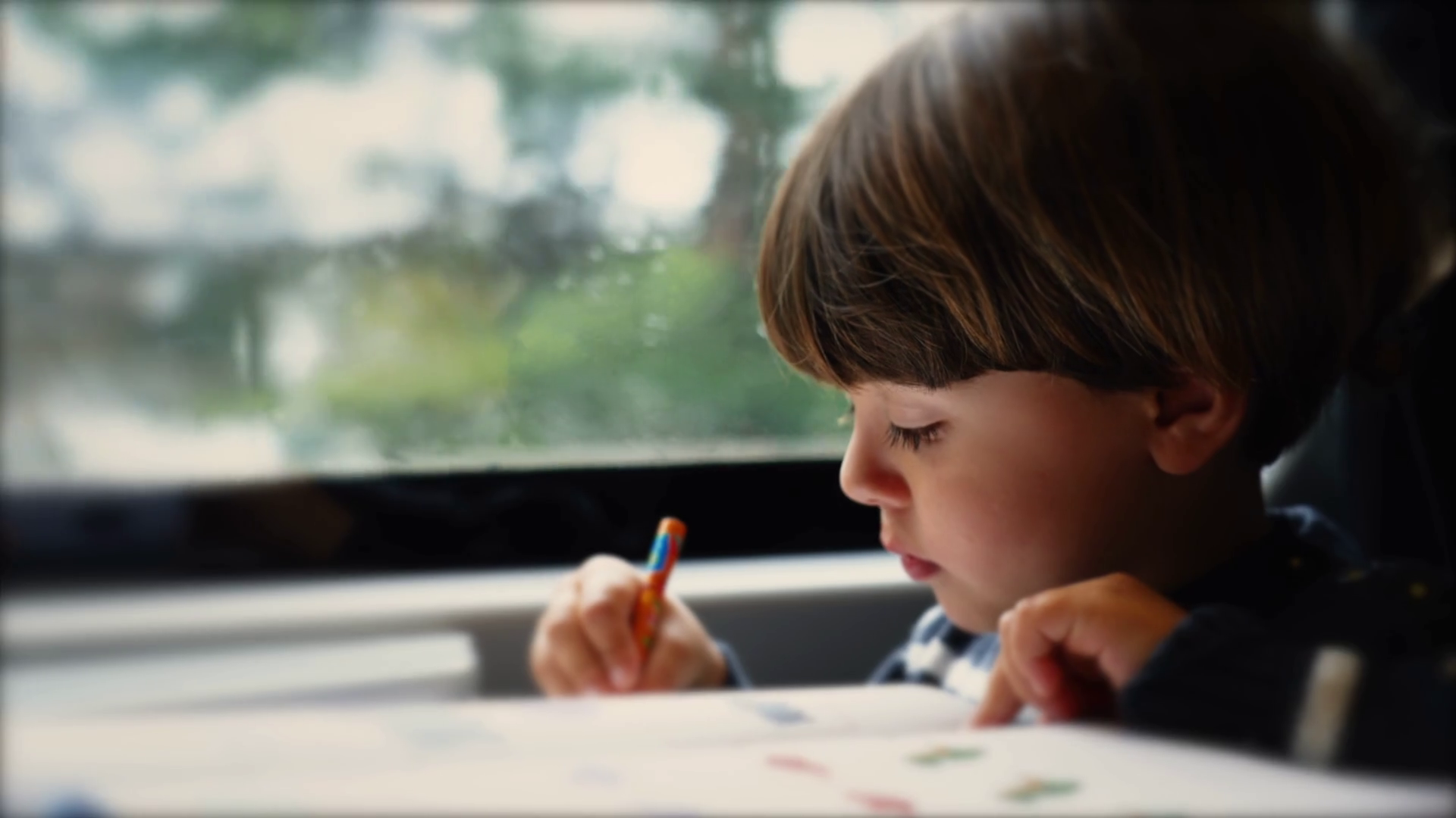 Little Boy Sitting Next To Window Drawing Stock Footage SBV-348894599 ...