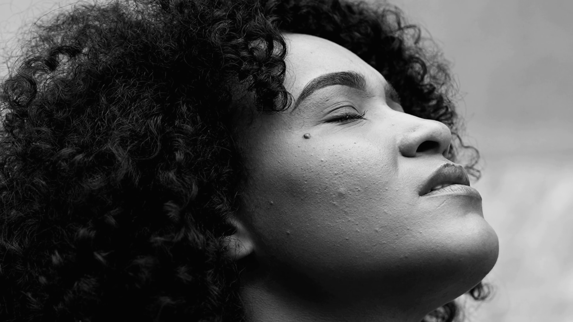 Contemplative Young Black Woman Looks Up At Stock Footage SBV-348783194 ...