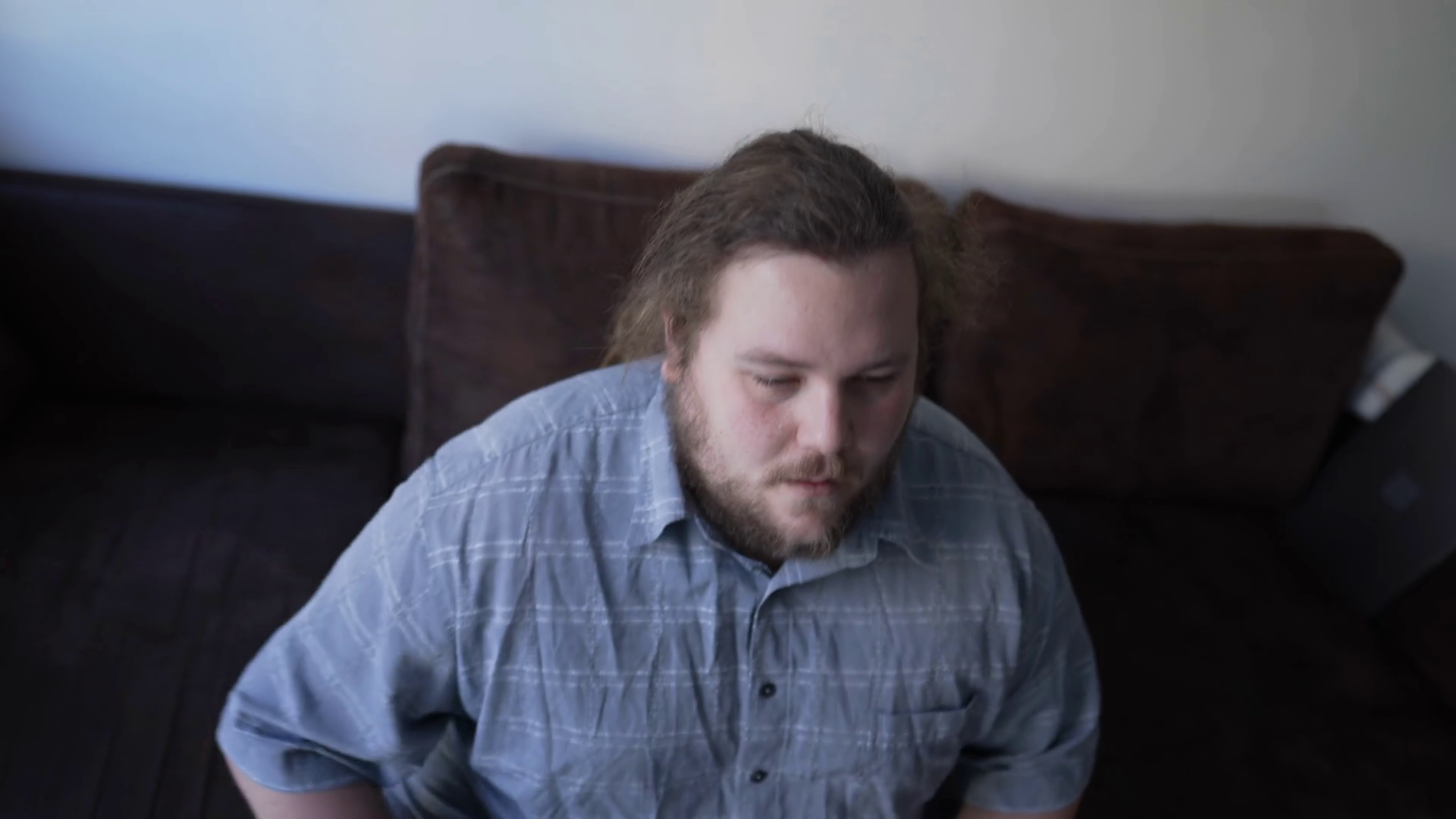 Sedentary Discomfort: Overweight Man's Stock Footage SBV-348440919 ...