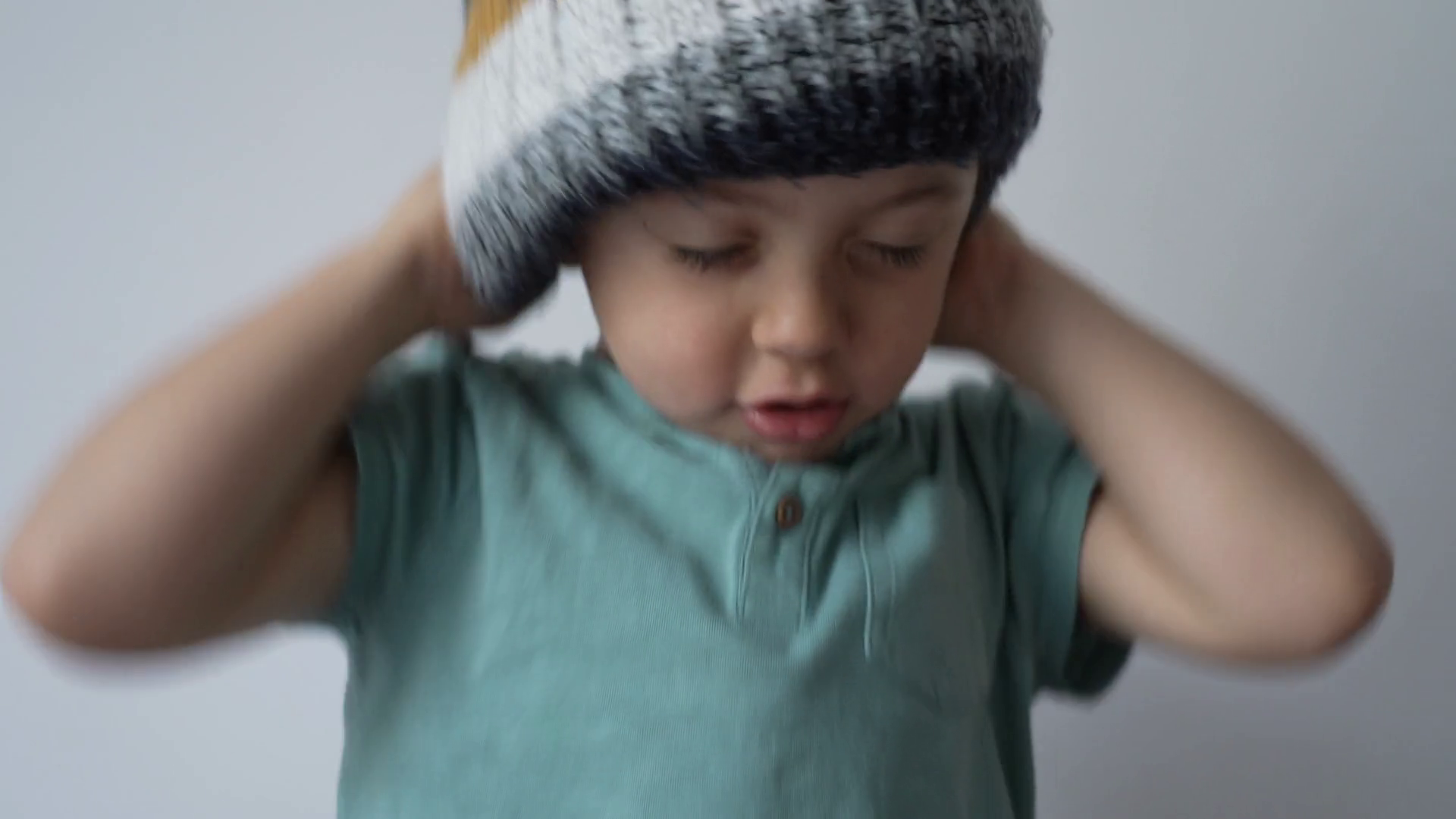 One Little Boy Putting Beanie Covering Face Stock Footage SBV-348683995 ...
