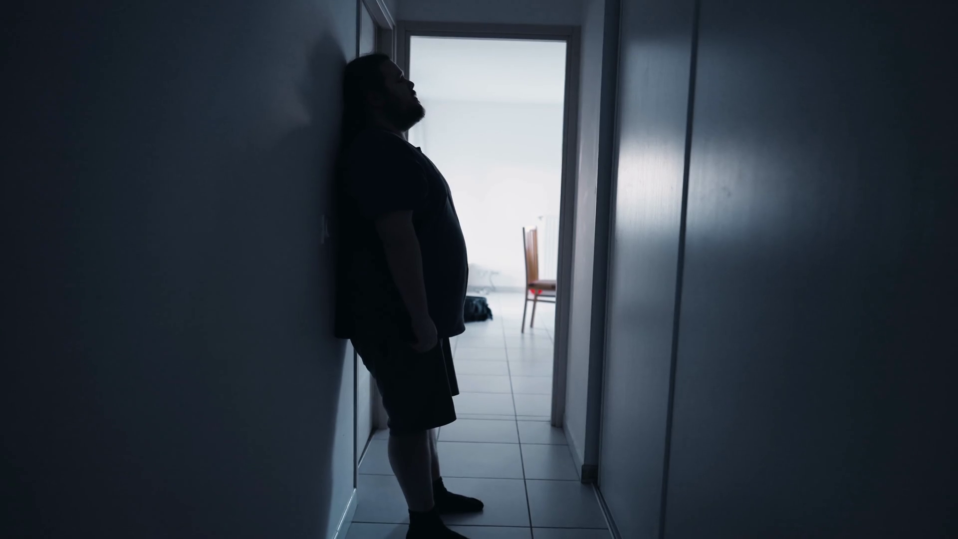 Solitary Despair: Depressed Man In Corridor Stock Footage SBV-348439503 ...