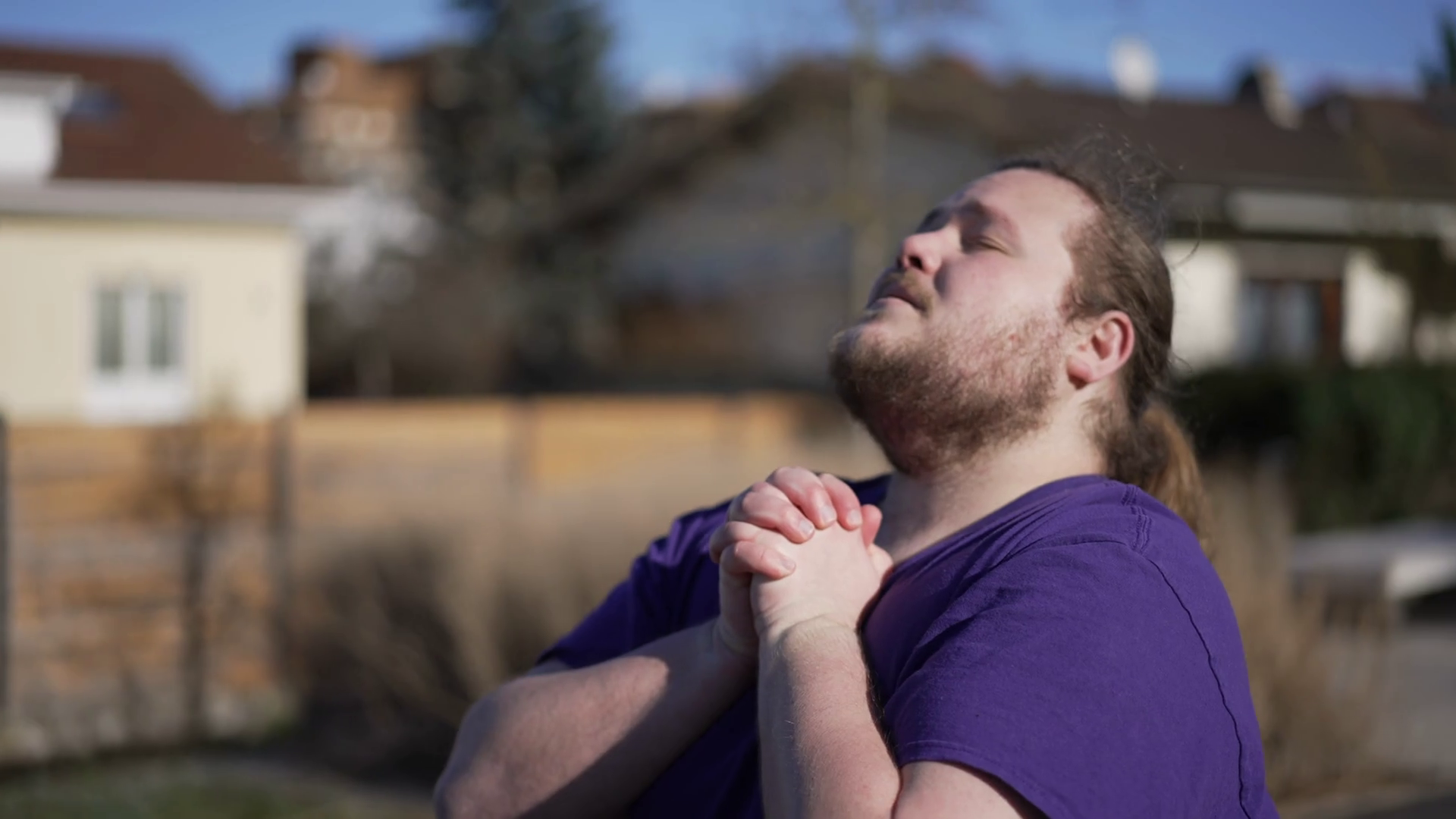 Seeking Solace: Young Man In Prayer Amidst Stock Footage SBV-348438426 ...