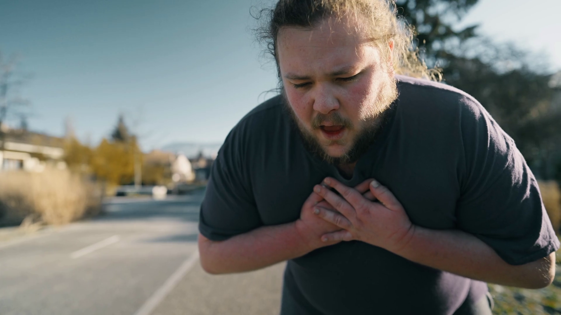 Struggling With Discomfort: Man Outdoors Stock Footage SBV-348437862 ...