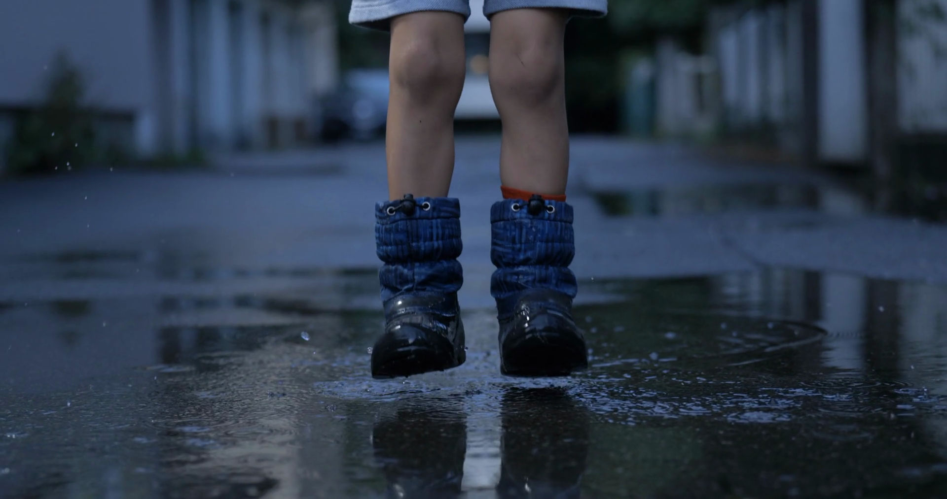 Playful Child Jumping Into Water Puddles In Stock Footage SBV-348820560 ...